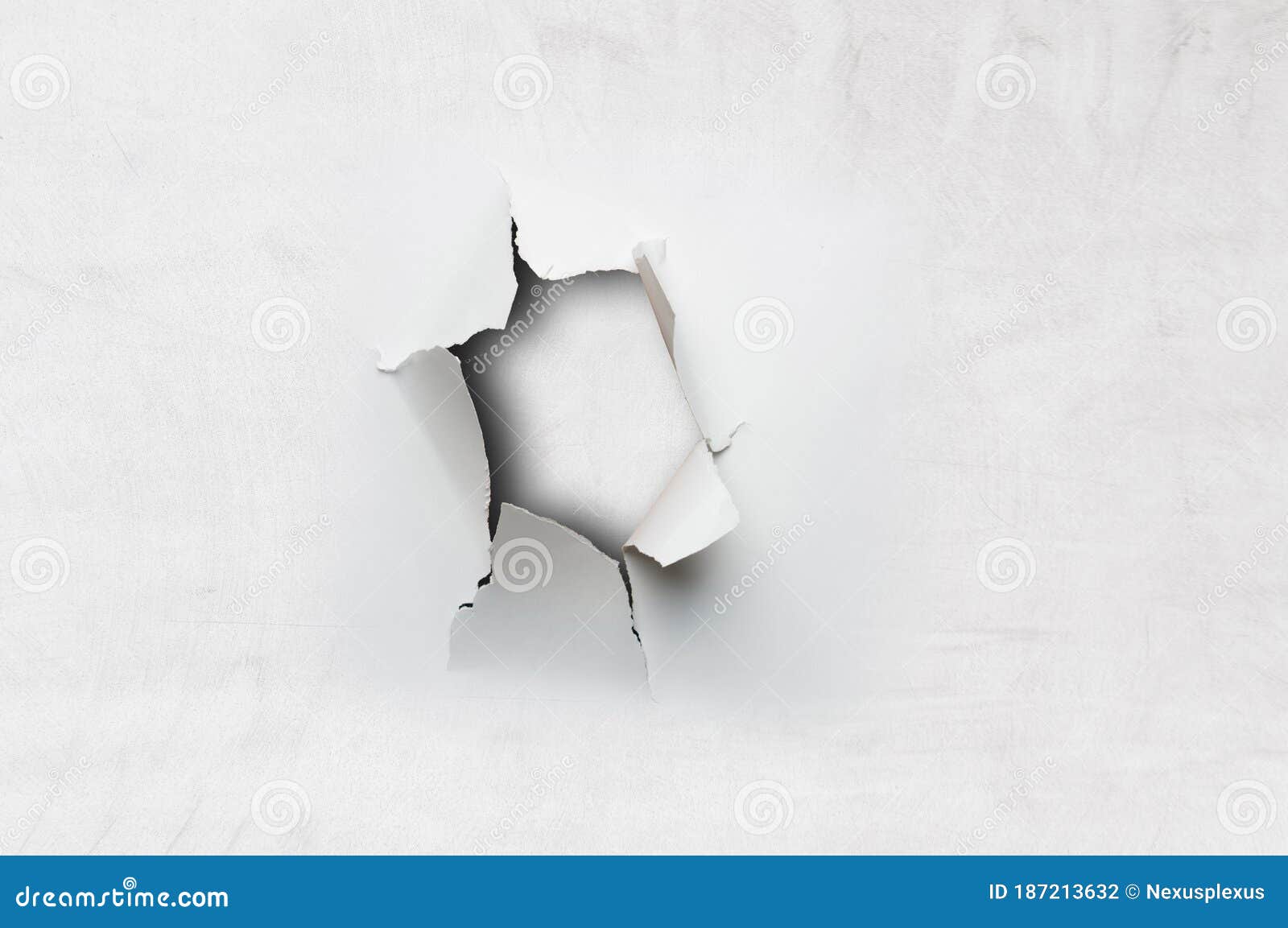 Hole in Paper on White Background Stock Photo - Image of lacerated ...