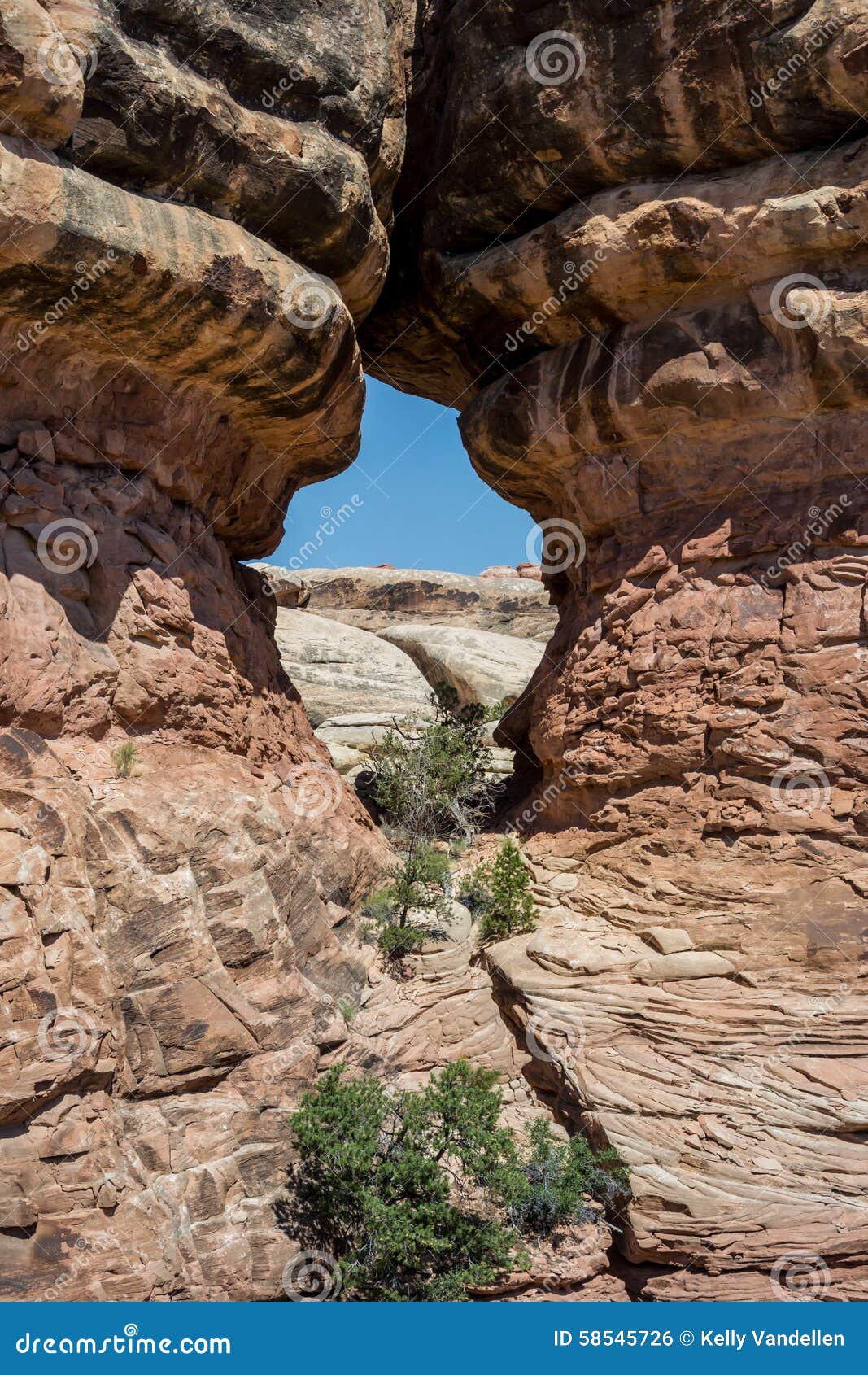 Hole through Rock Formations in the Needles Stock Photo - Image of ...