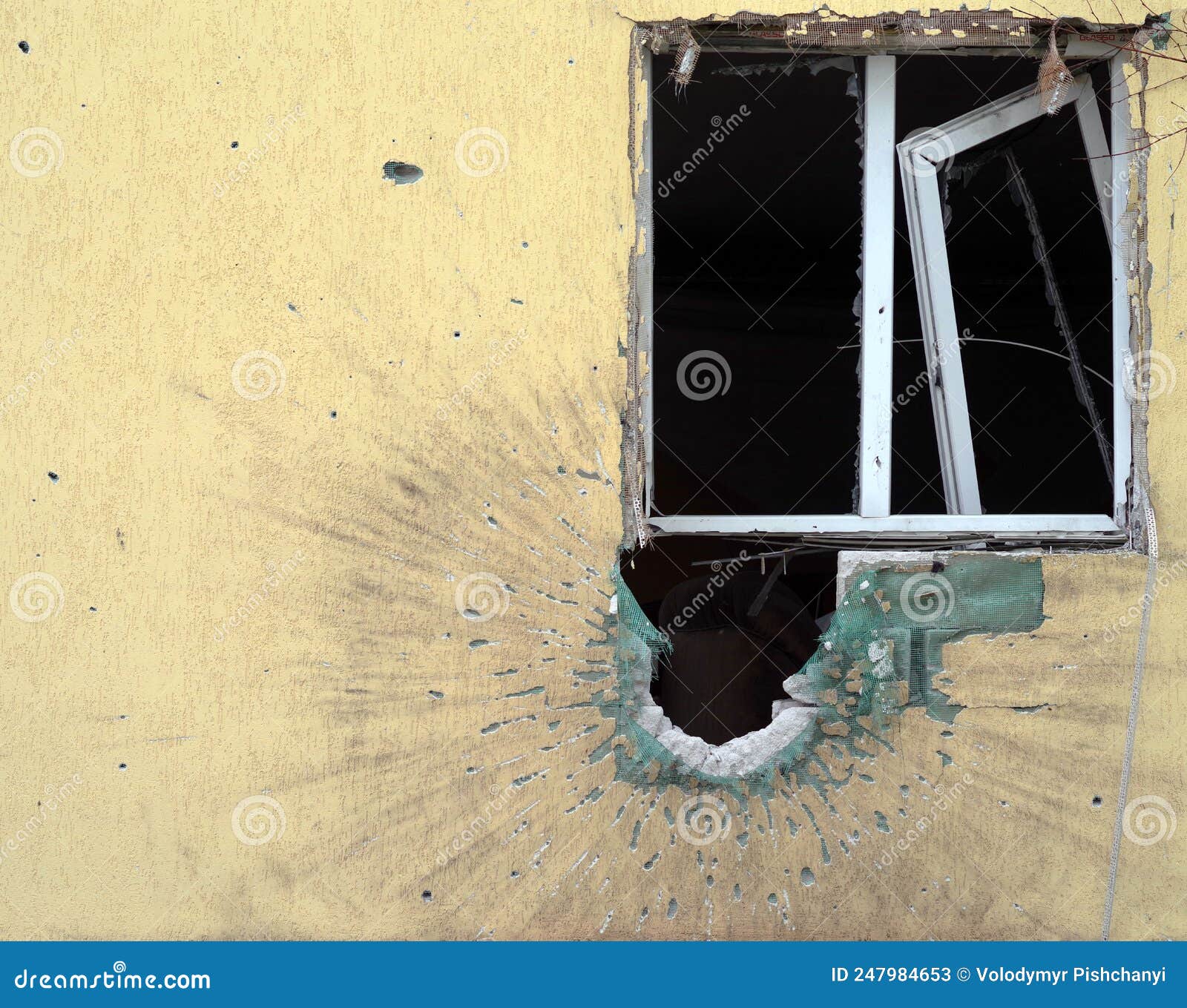 Hole in the Wall of the House from the Shell of the Russian Army. Stock ...