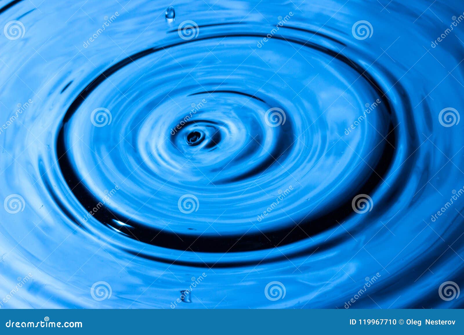 Hole in the Water from a Flying Drop Stock Photo - Image of flying ...