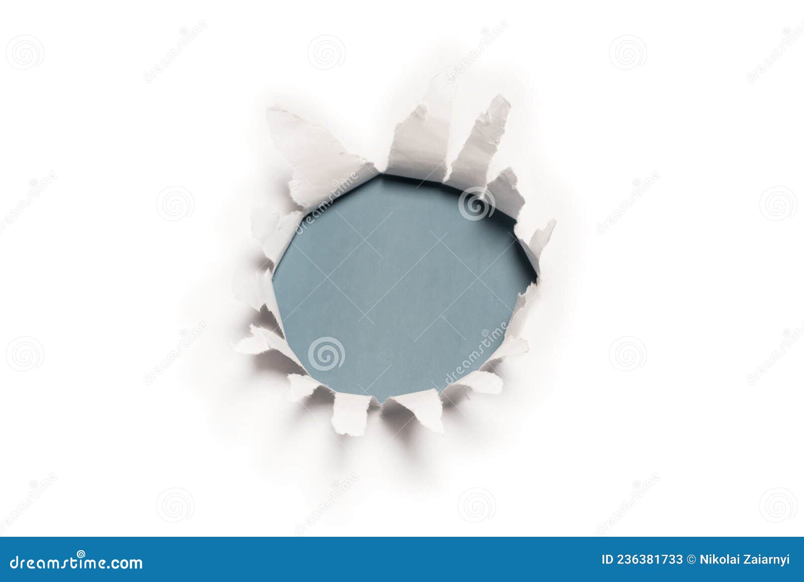 A Hole in a White Paper on a Blue Background Stock Image - Image of ...