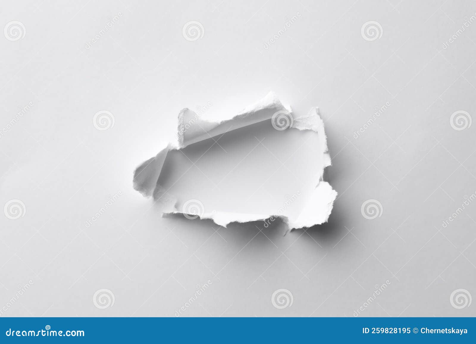 Hole in White Paper on Light Background Stock Image - Image of light ...