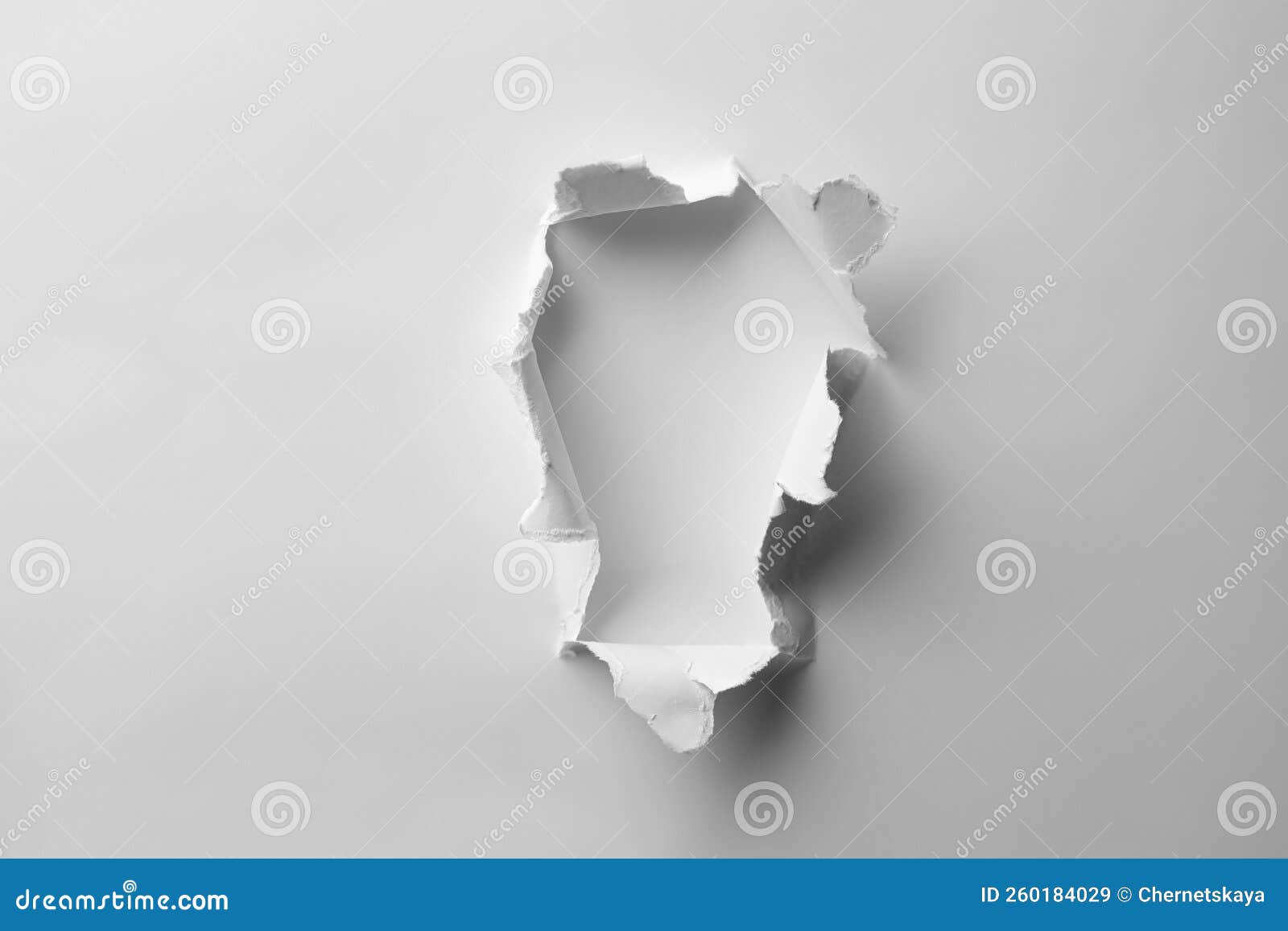 Hole in White Paper on Light Background Stock Image - Image of empty ...
