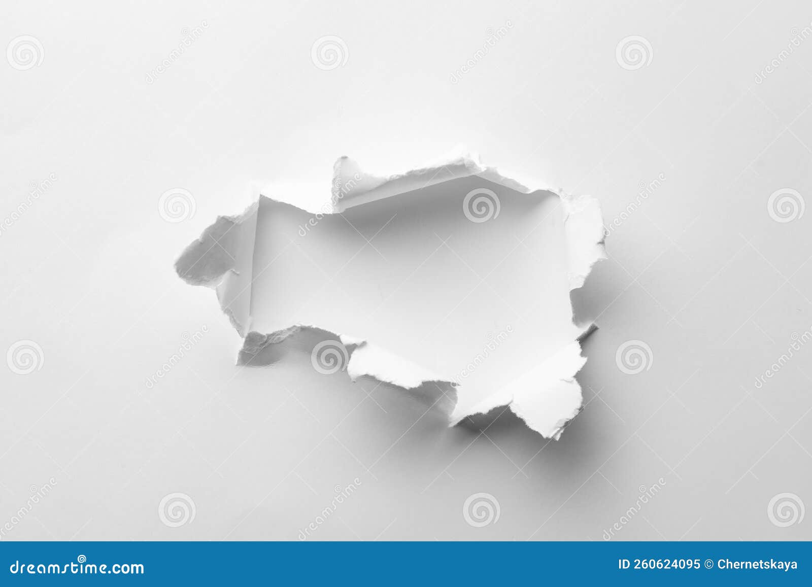 Hole in White Paper on Light Background Stock Image - Image of industry ...