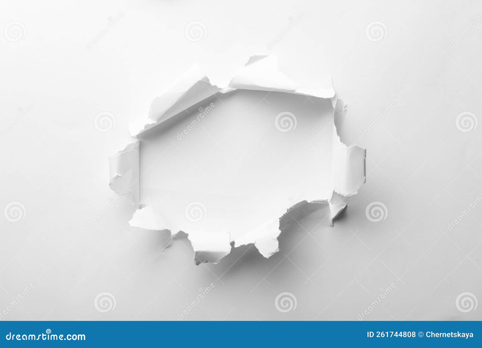 Hole in White Paper on Light Background Stock Photo - Image of light ...