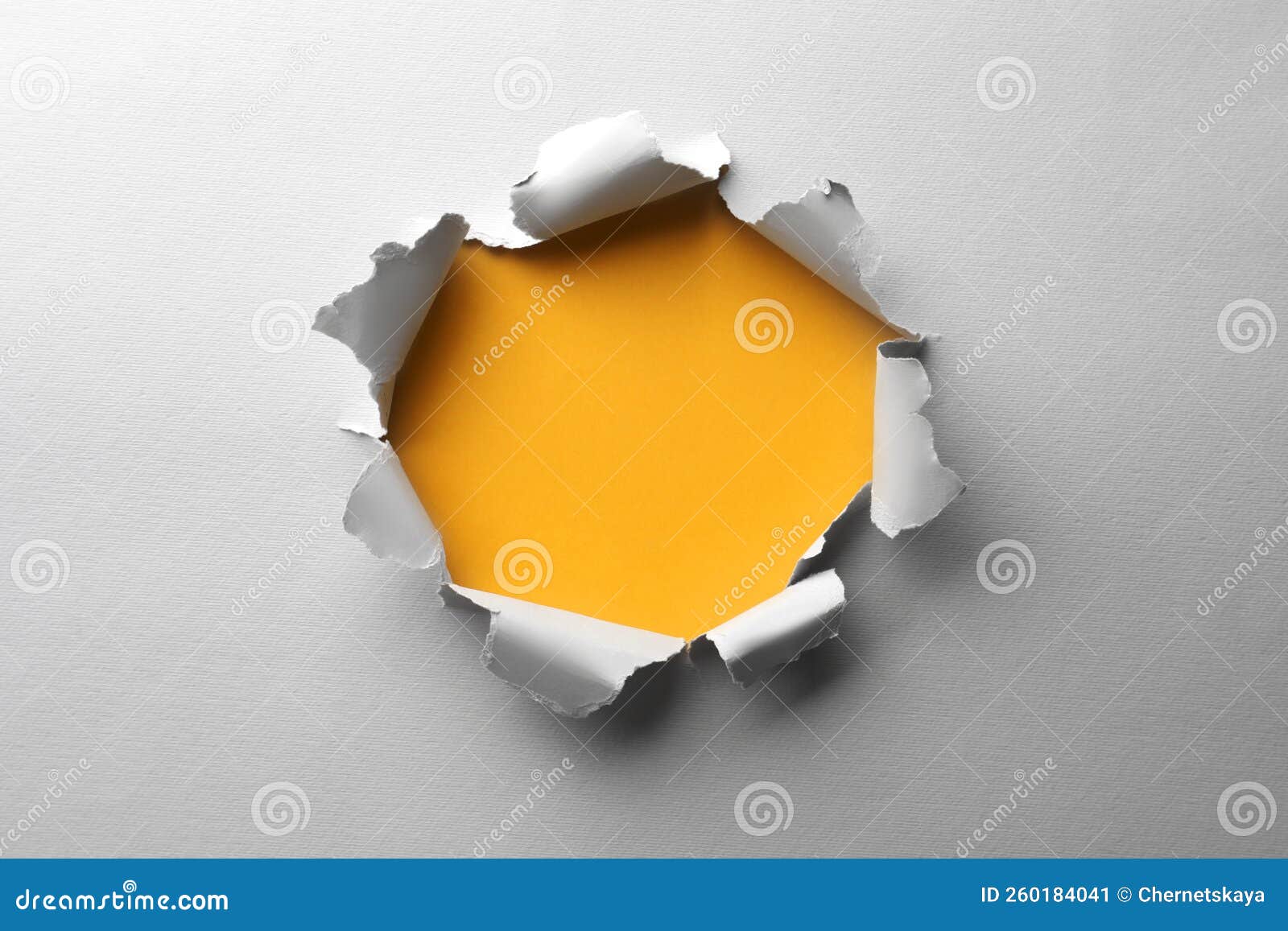 Hole in White Paper on Yellow Background Stock Image - Image of ...
