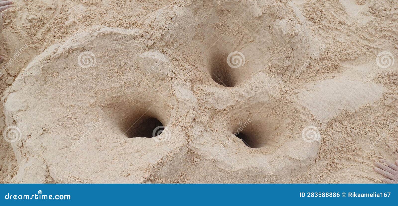 The Holes on the Sand of the Beach Stock Photo - Image of temple ...