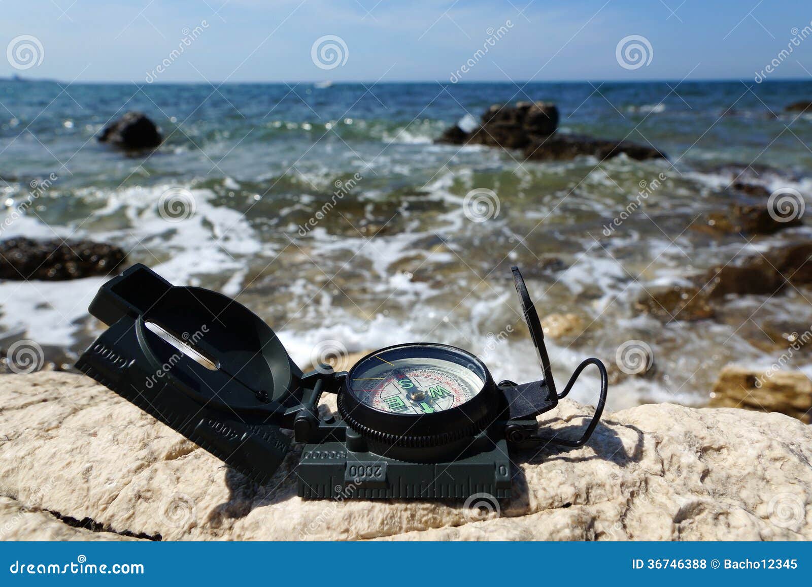 Holiday Destination Concept with Compass on Sea Stock Photo - Image of ...