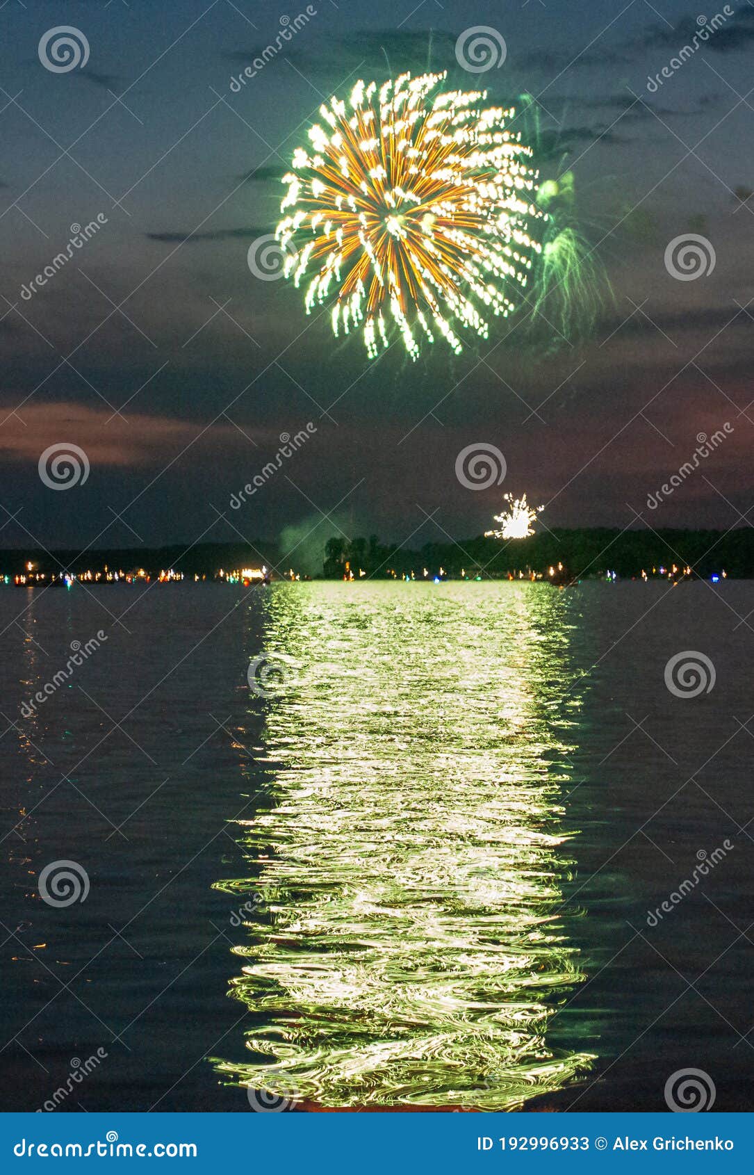 Holiday Fireworks with Water Reflection at Night Black Sky Stock Image ...