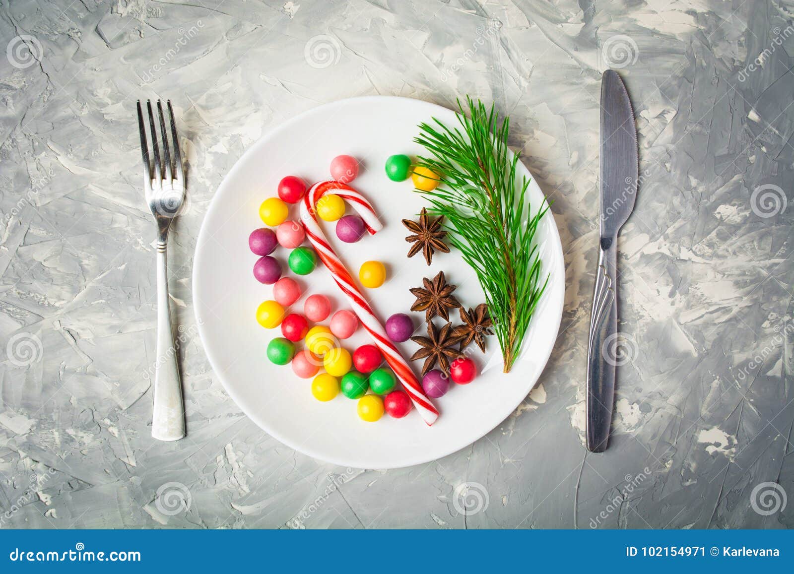 Holiday Serving Concept with Candies on Plate and Flatware Stock Image ...