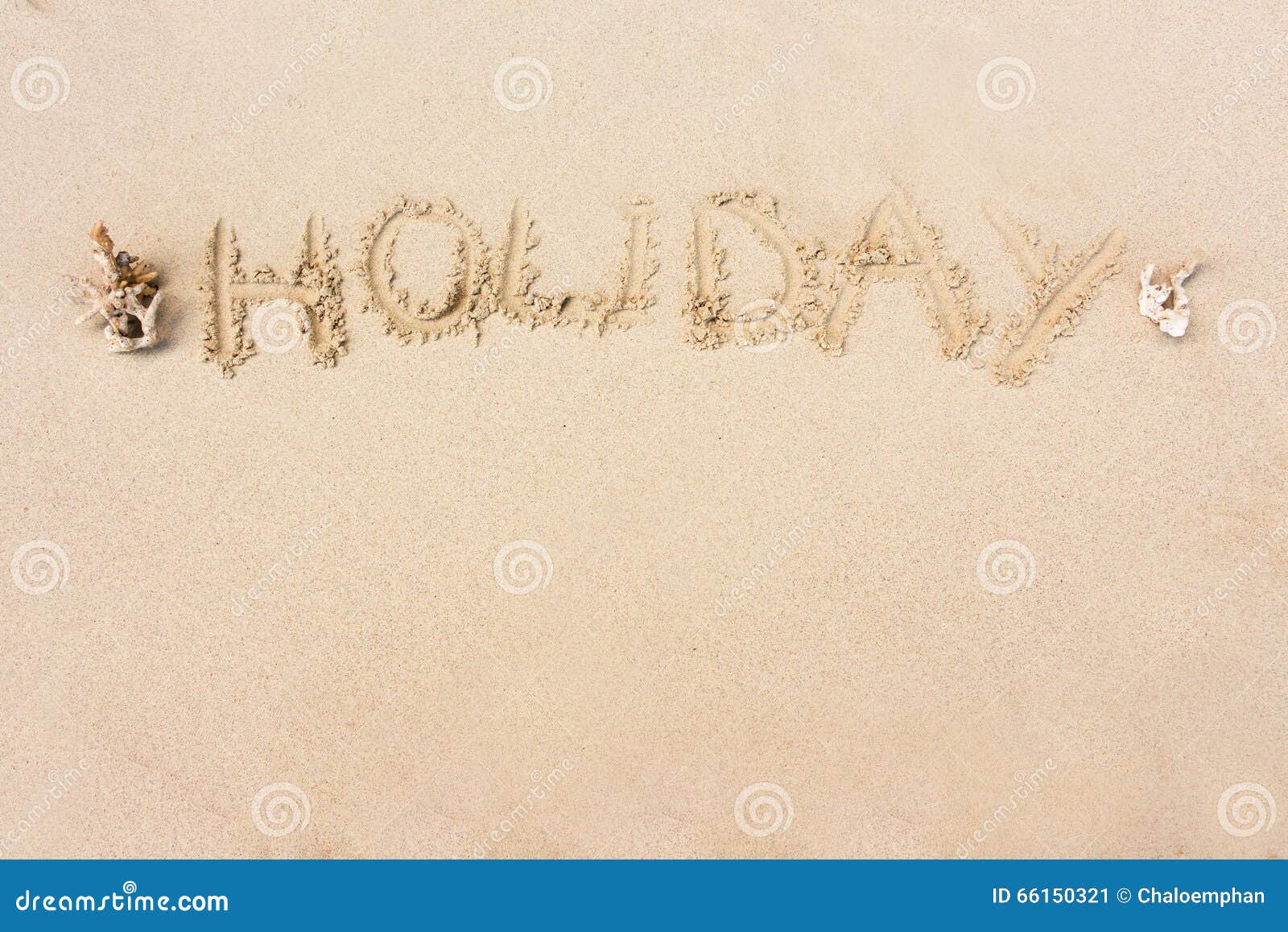HOLIDAY Written in the Sand on the Beach with Copy Space for T Stock ...