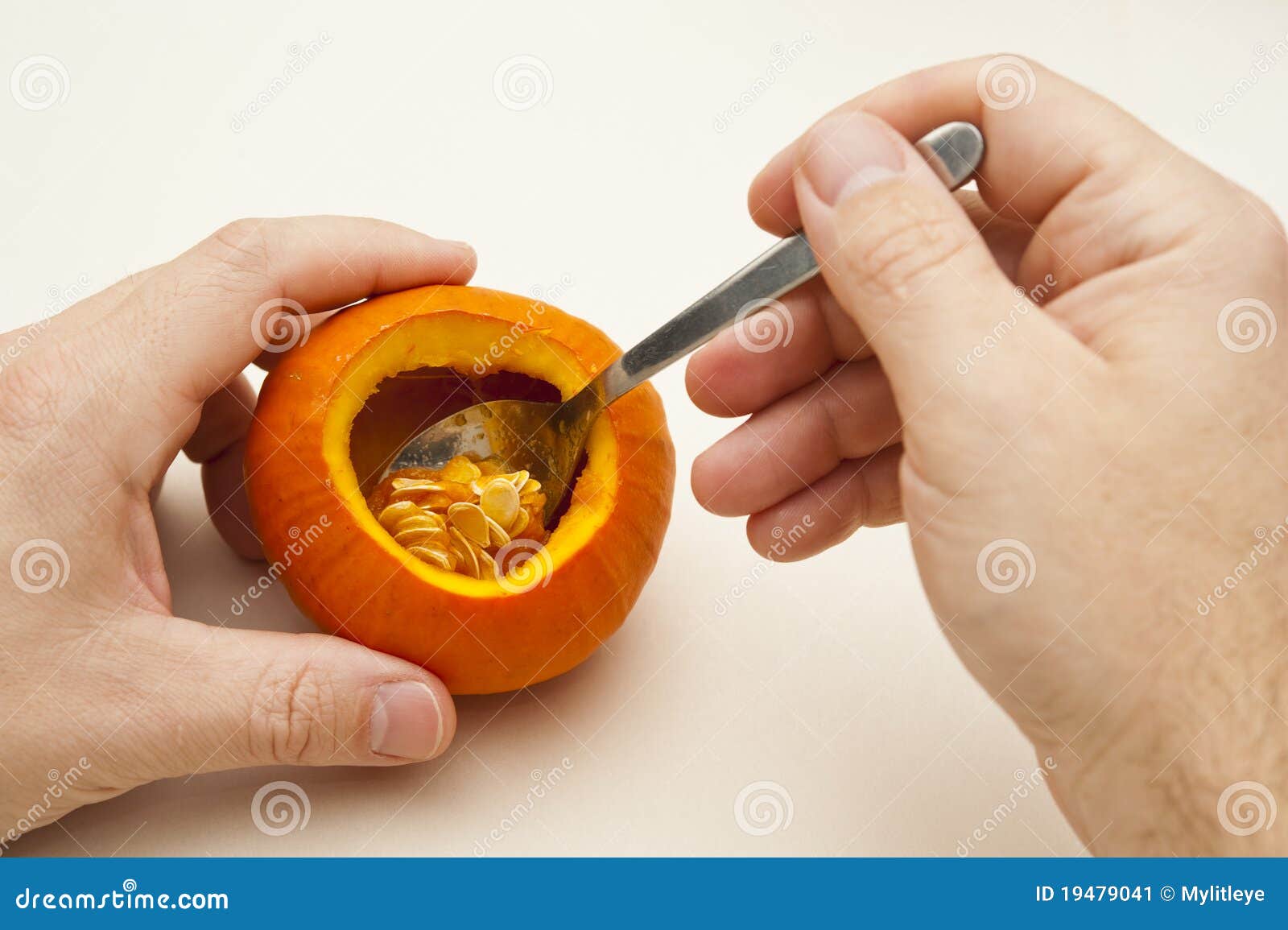 Hollowing out the Pumpkin stock image. Image of squash - 19479041