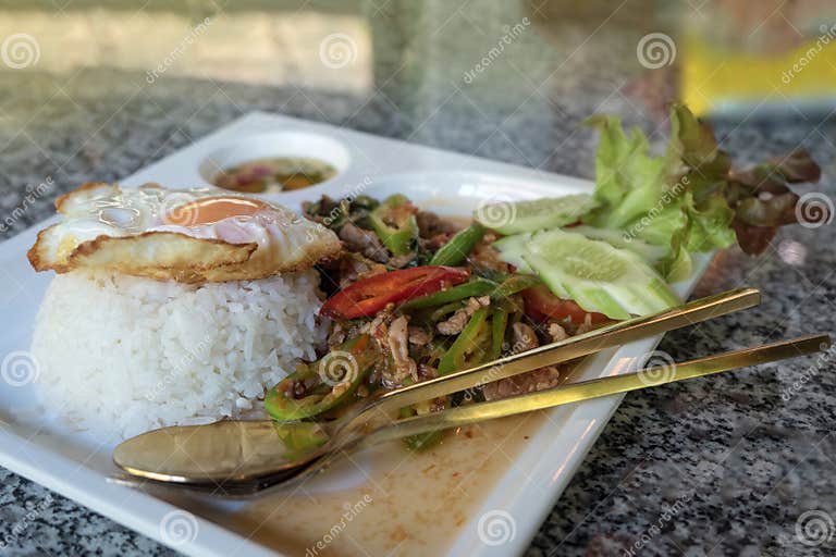 Holy Basil Fried Rice with Beef and Fried Egg Stock Image - Image of ...