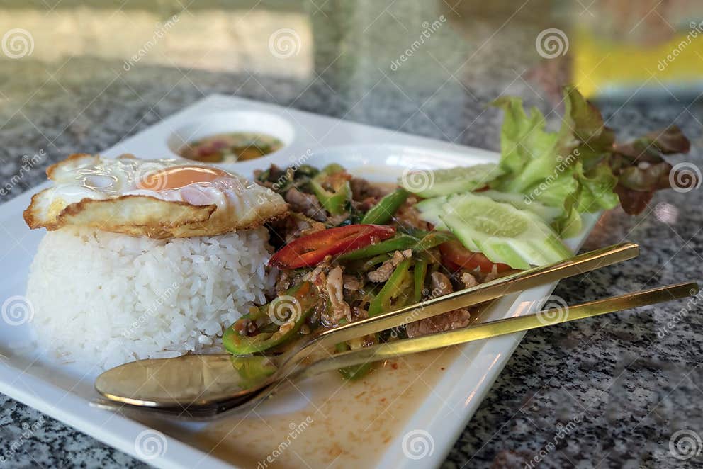 Holy Basil Fried Rice with Beef and Fried Egg Stock Image - Image of ...