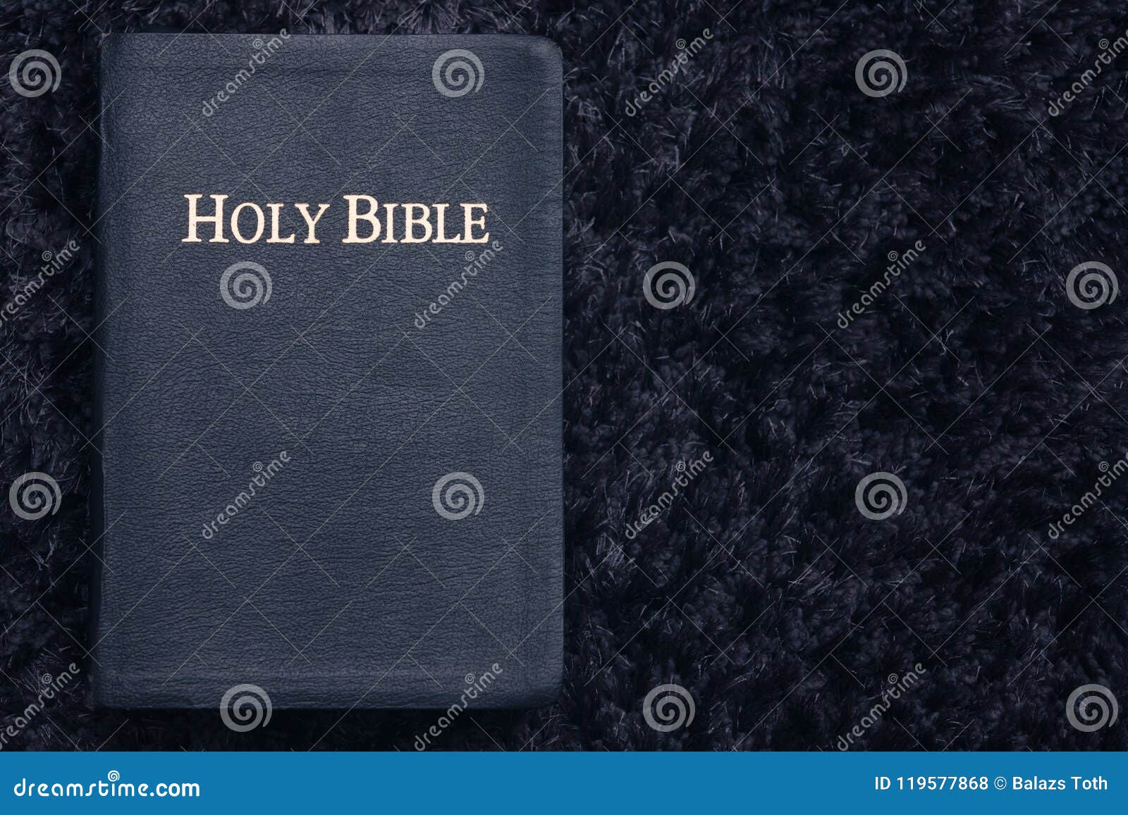 Holy Bible on Dark Texture stock photo. Image of passage - 119577868