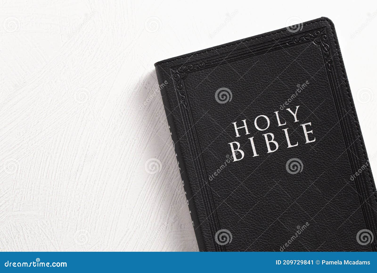 Holy Bible on a Textured White Surface Stock Image - Image of christian ...