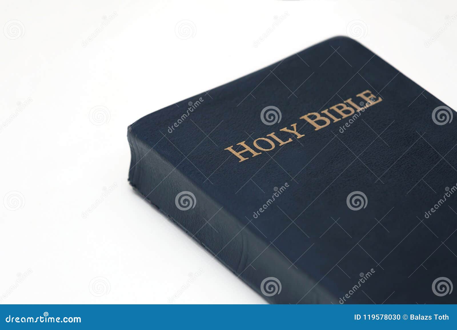 Holy Bible on White Surface Stock Photo - Image of faith, book: 119578030