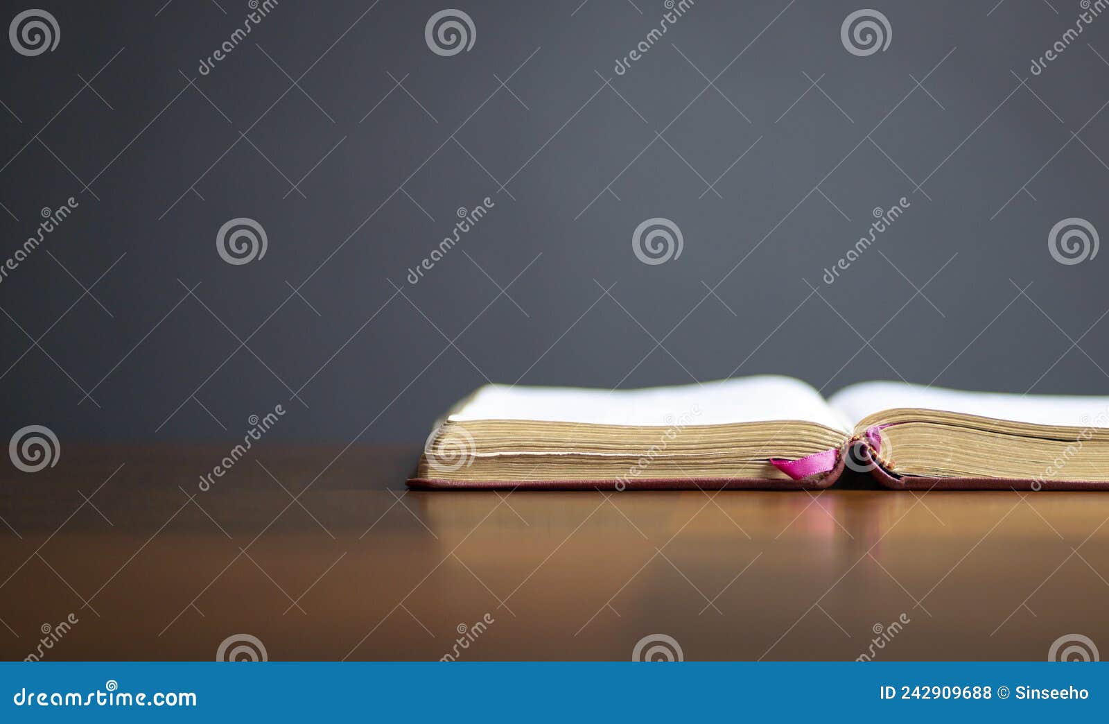 Holy Bible on wood table stock photo. Image of protestant - 242909688