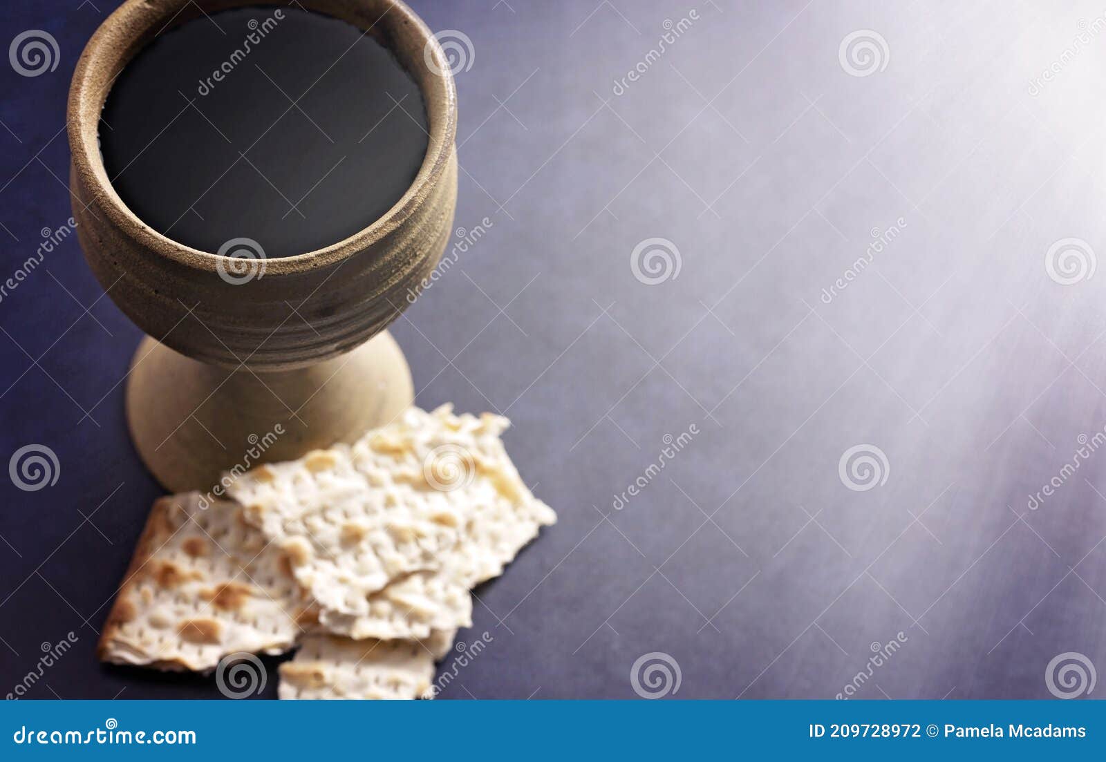 Holy Communion on a Dark Blue Surface in the Sunlight Stock Photo ...