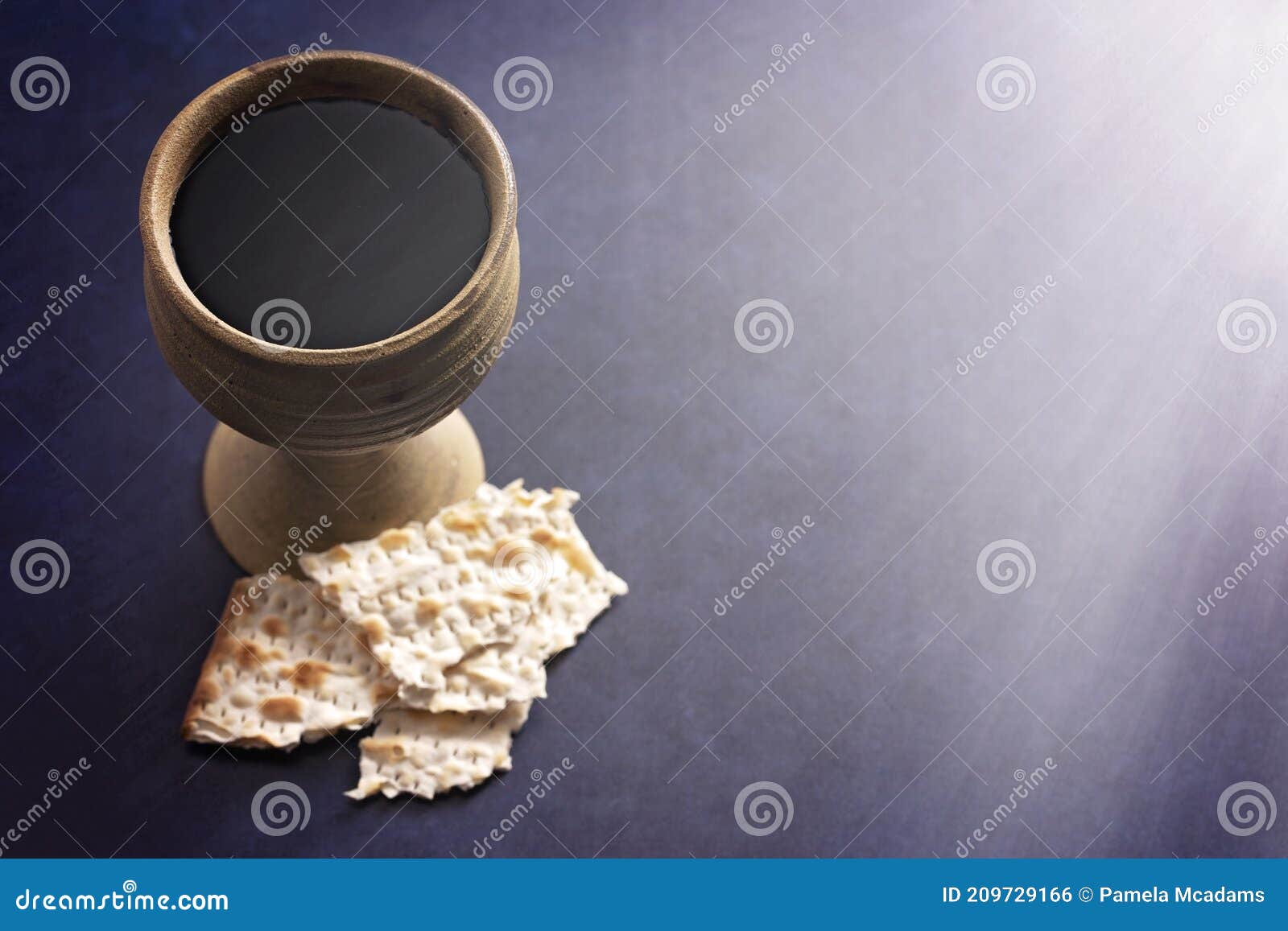 Holy Communion on a Dark Blue Surface in the Sunlight Stock Photo ...