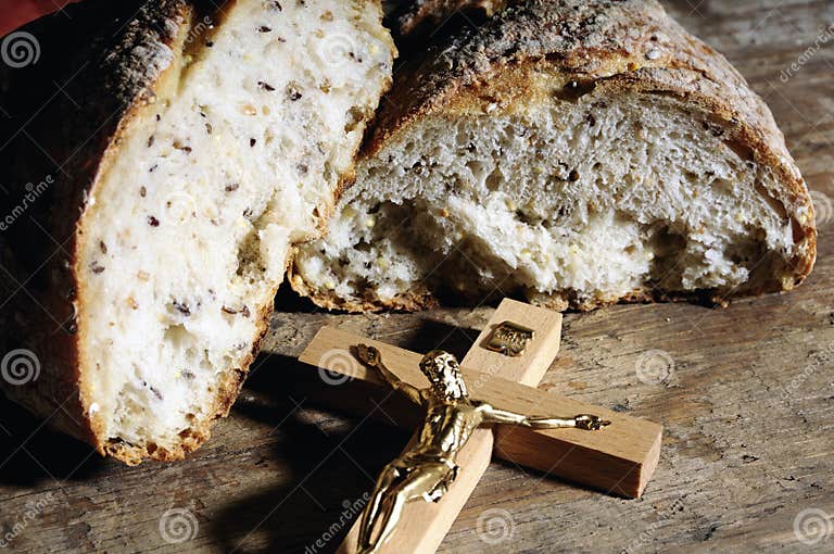Holy cross and bread stock image. Image of crucifixion - 8099451