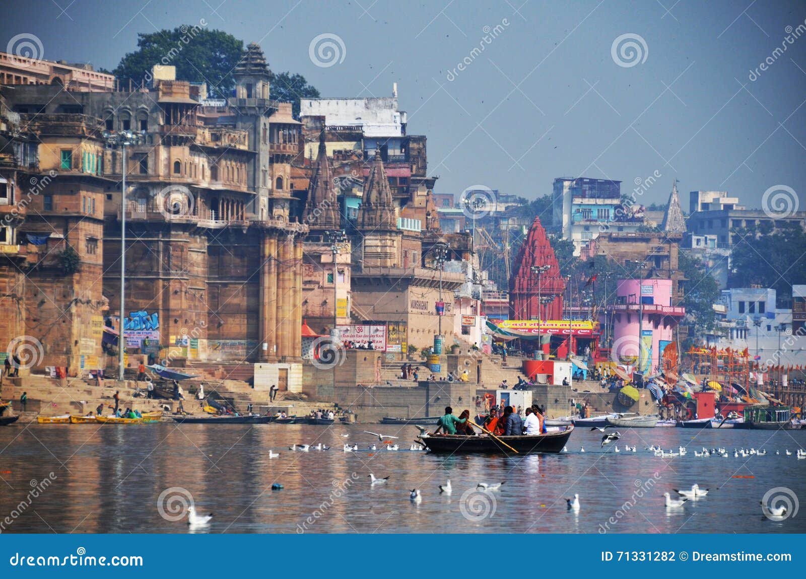 Holy Ganges River at Varanasi with Rowing Boat and Seagulls Editorial ...