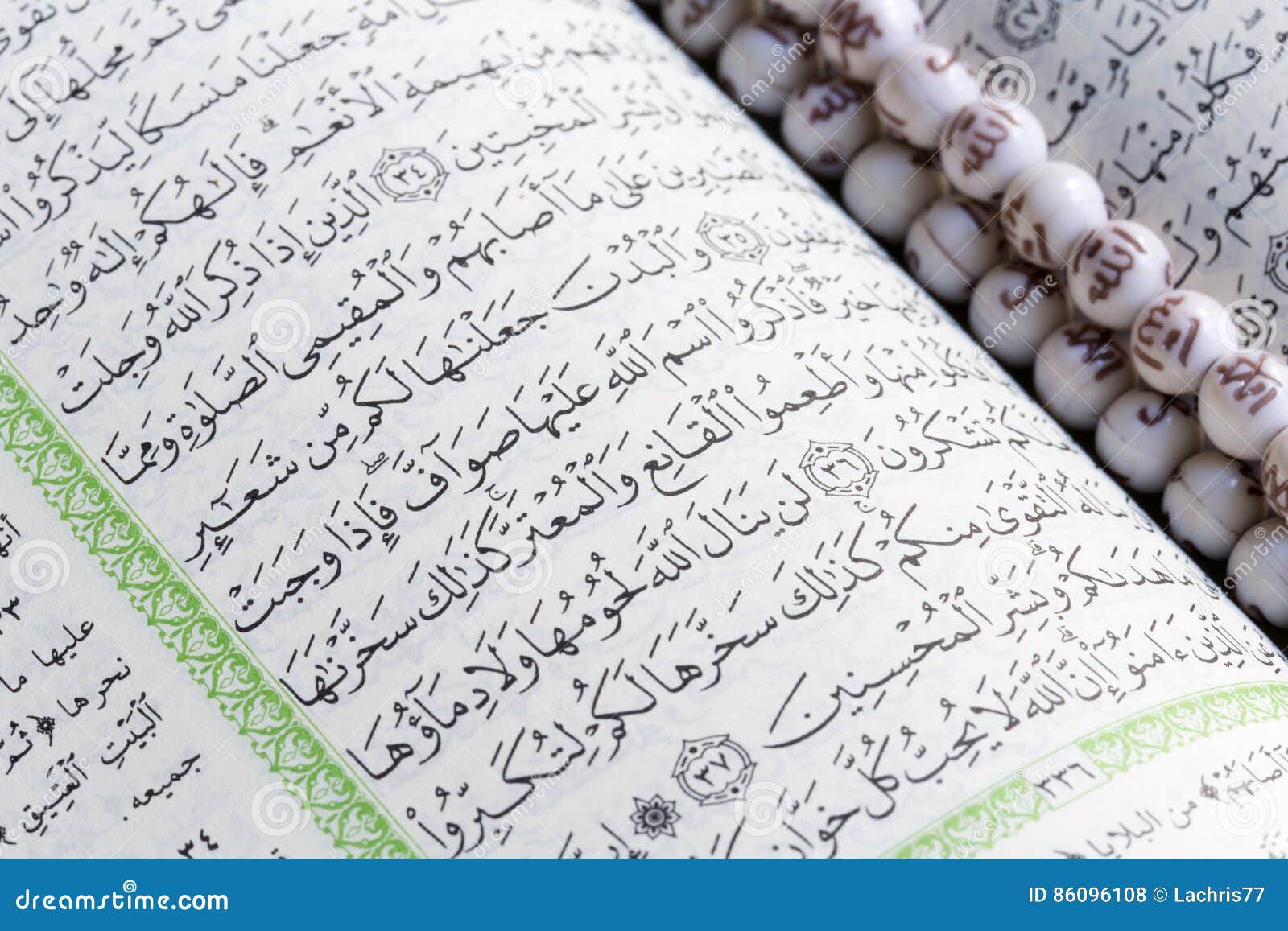 The holy Quran opened stock photo. Image of islamic, book - 86096108