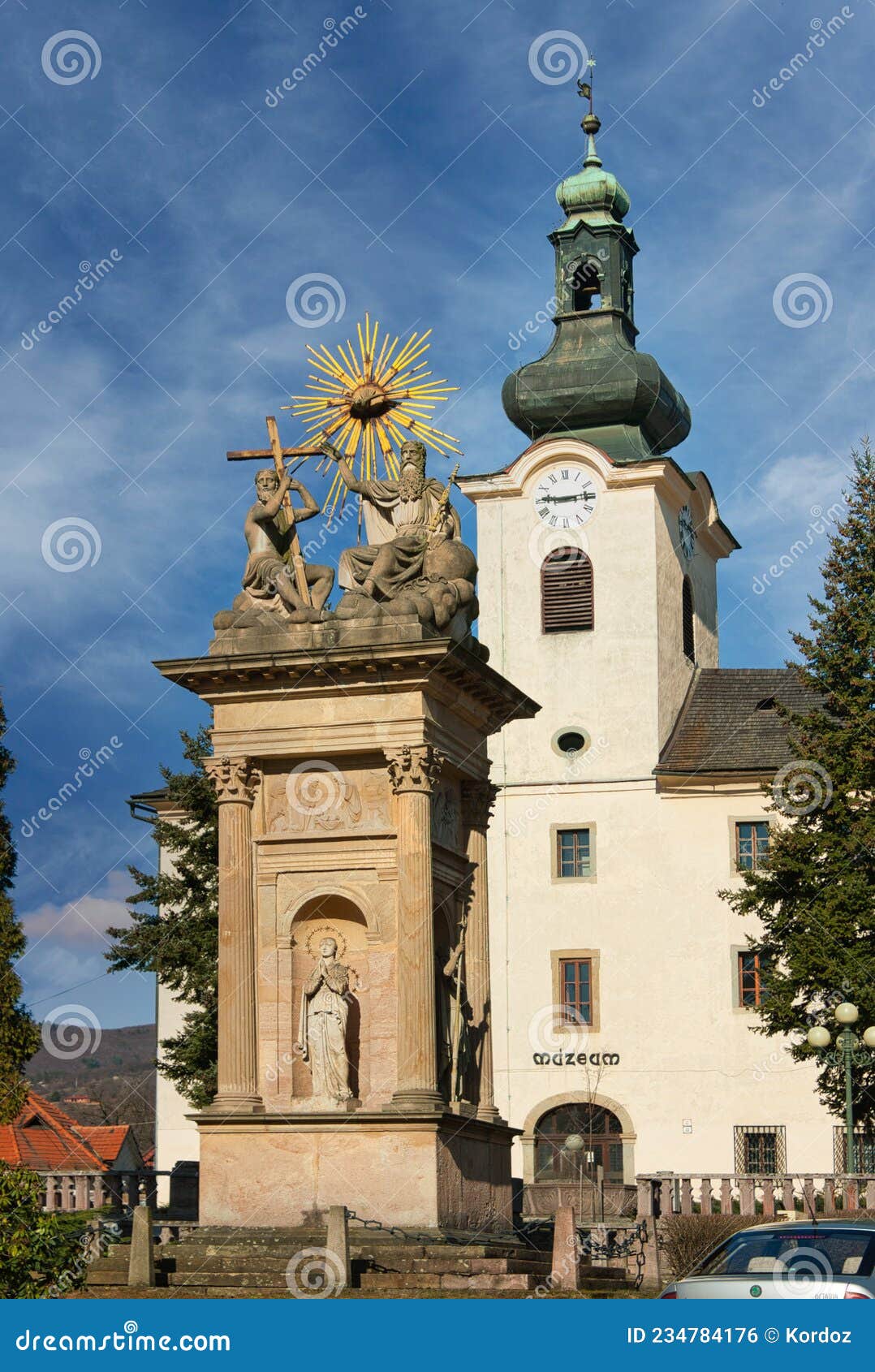 The Holy Trinity Classicist Column in Nova Bana with Town Hall Museum ...