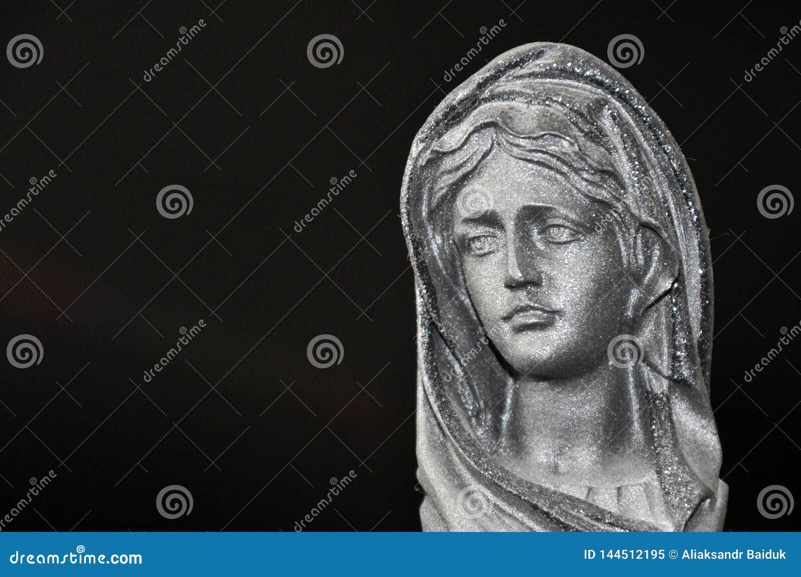 Holy Virgin Mary in the Rays of Sunlight on a Black Background. Concept ...