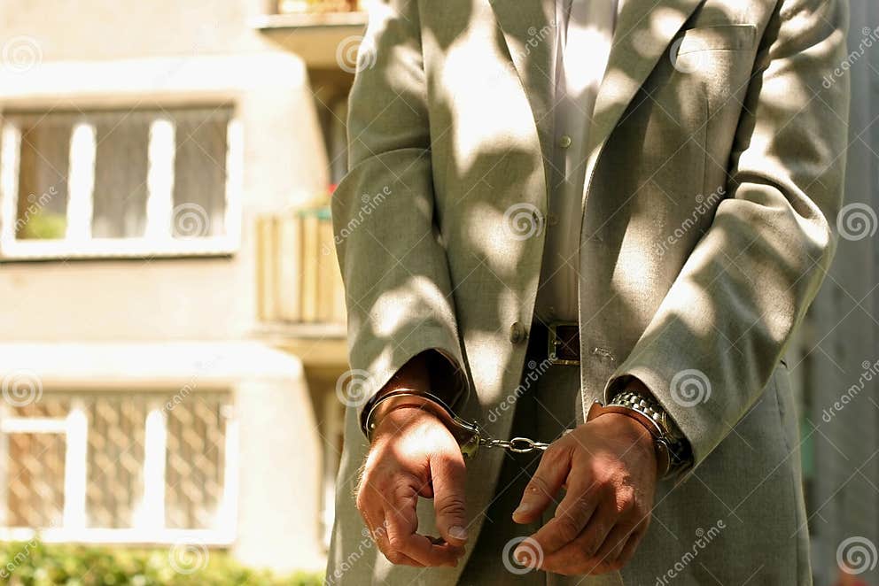 Hombre arrestado foto de archivo. Imagen de servidumbre - 1688164