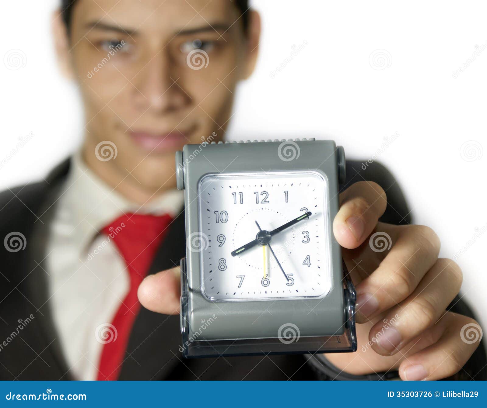 Hombre De Negocios Con Un Reloj Foto de archivo - Imagen de vestido ...
