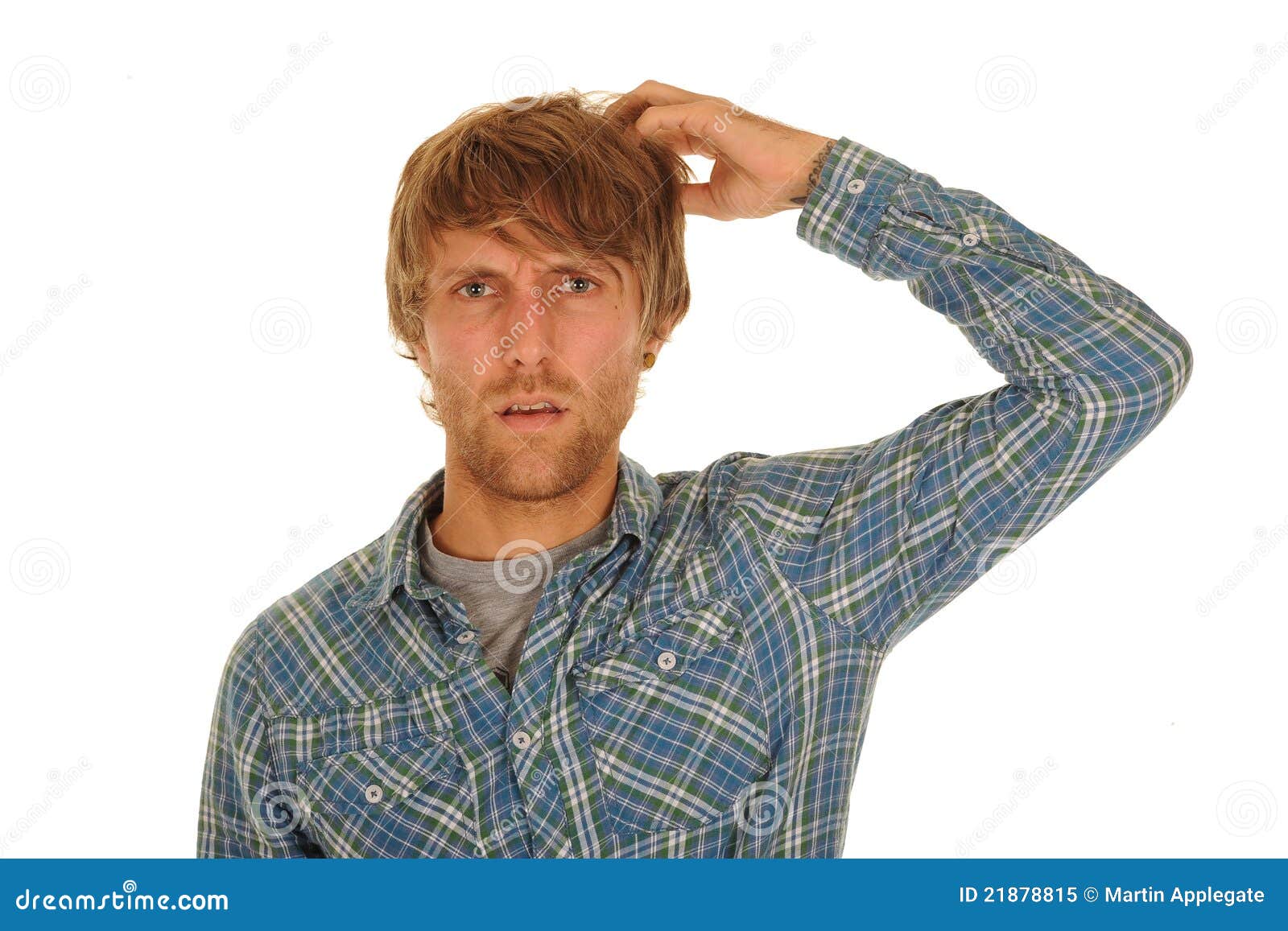 Hombre joven confuso imagen de archivo. Imagen de brazo - 21878815