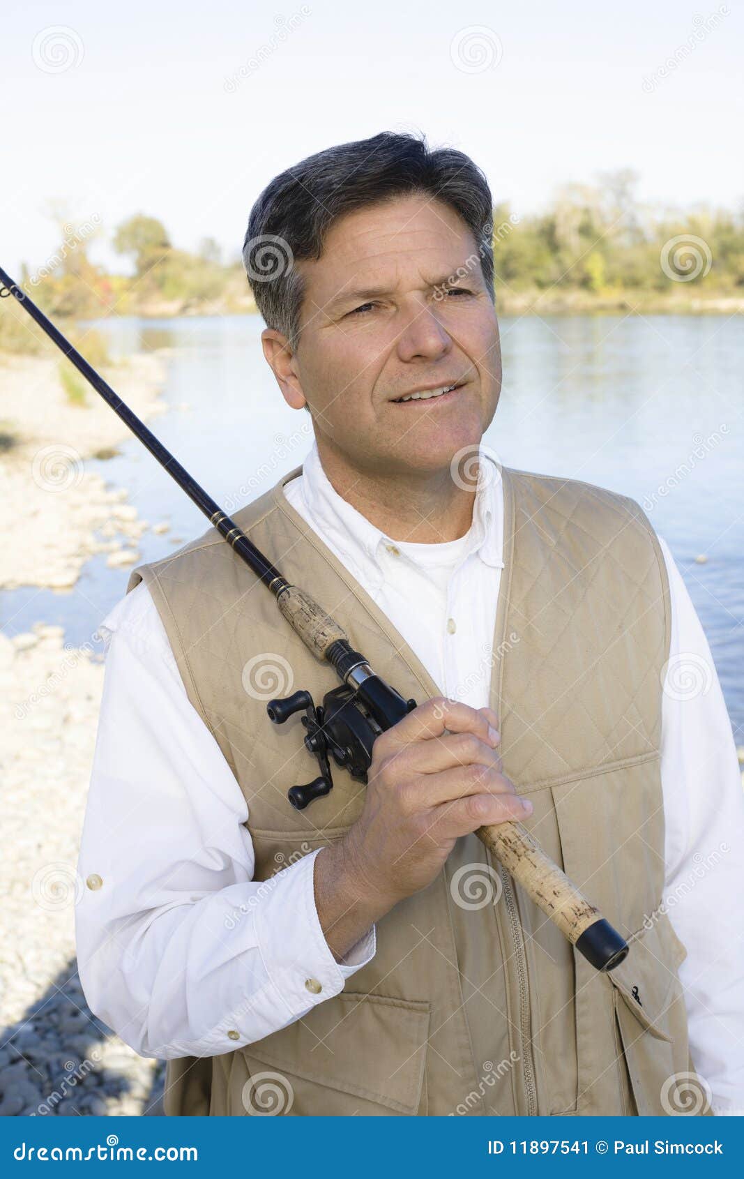 Hombre Que Se Coloca Con El Trole Imagen de archivo - Imagen de hombre ...