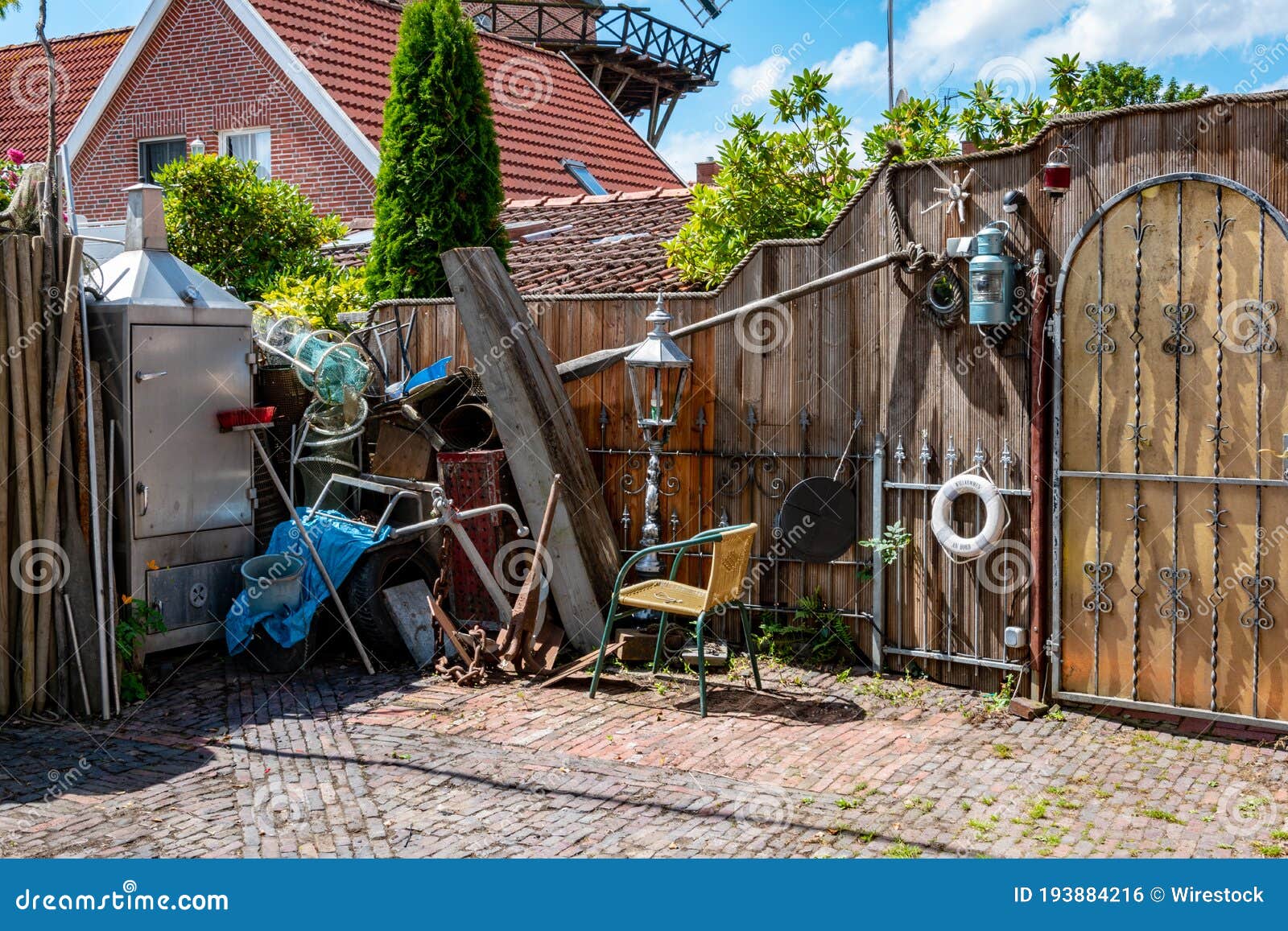 Home Backyard with Many Random Tools and Gardening Objects Stock Photo ...