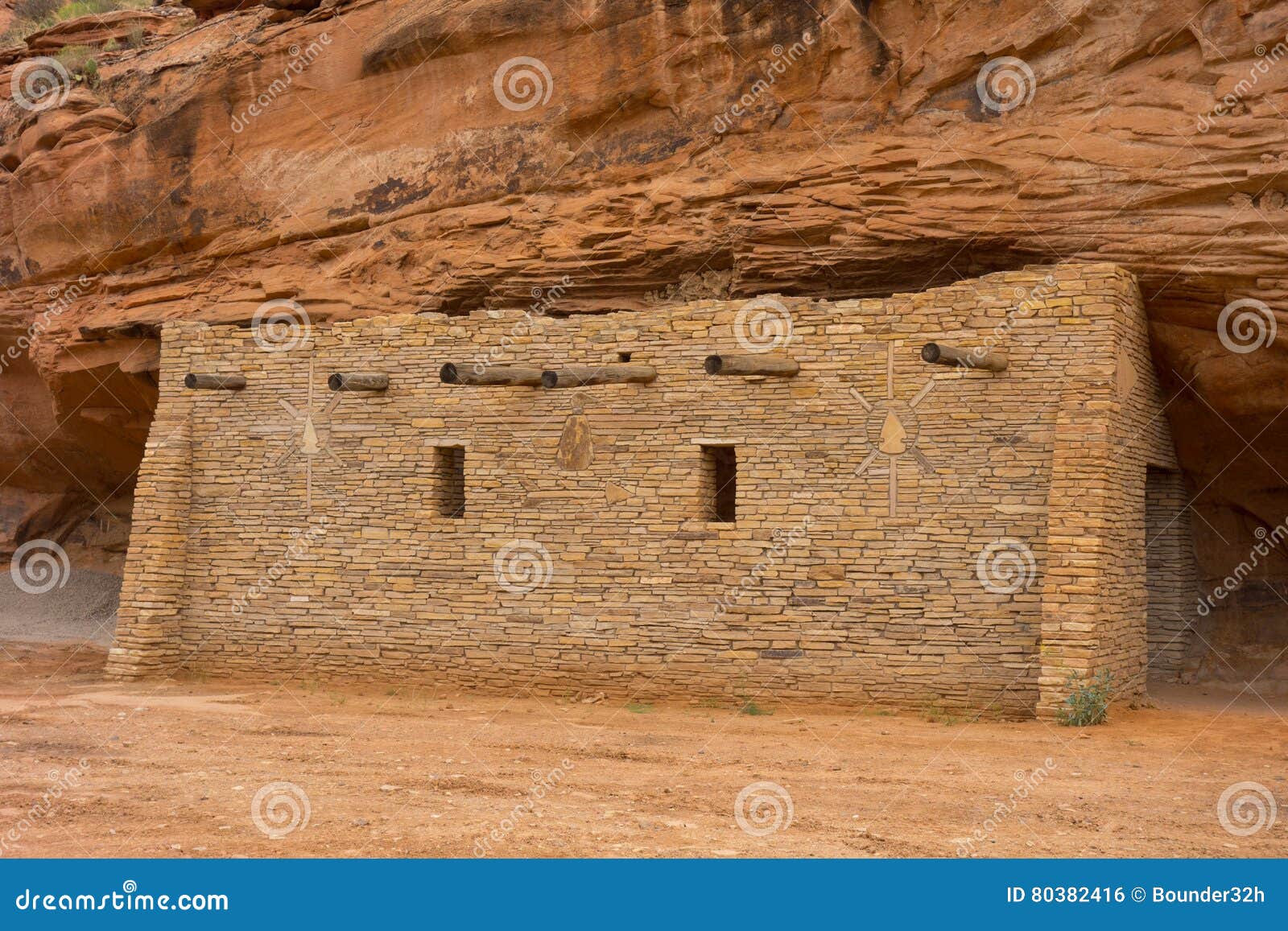 A Home Built into Cliffs in the Desert Stock Photo - Image of moab ...
