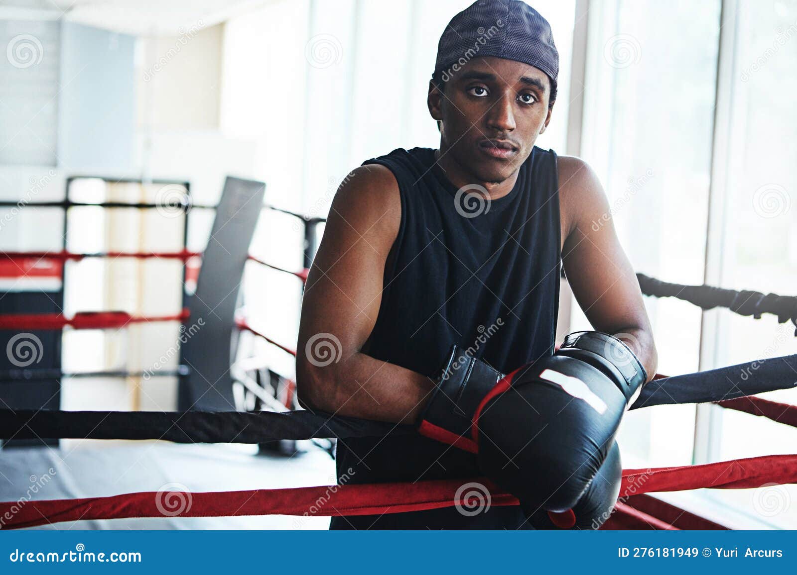 The Home of a Champion. Portrait of a Young Man Training in a Boxing ...