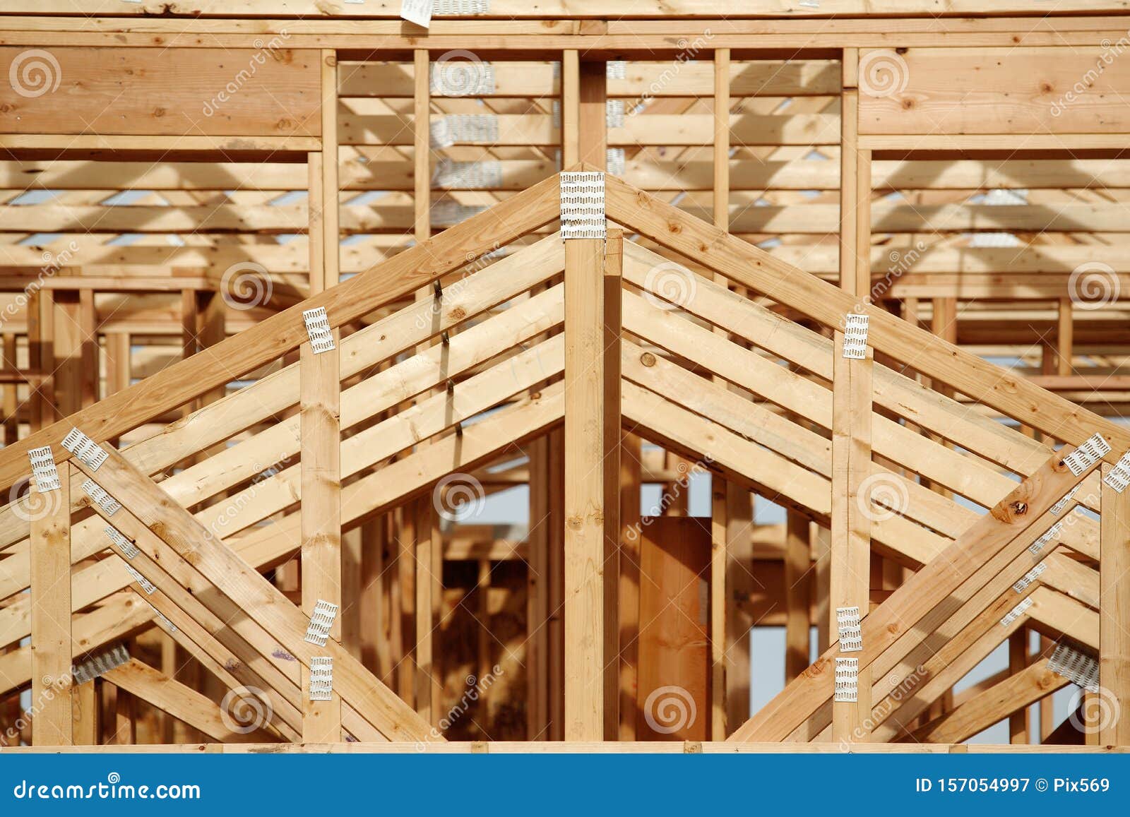 Engineered Roof Trusses on a New Home Under Construction. Stock Image ...