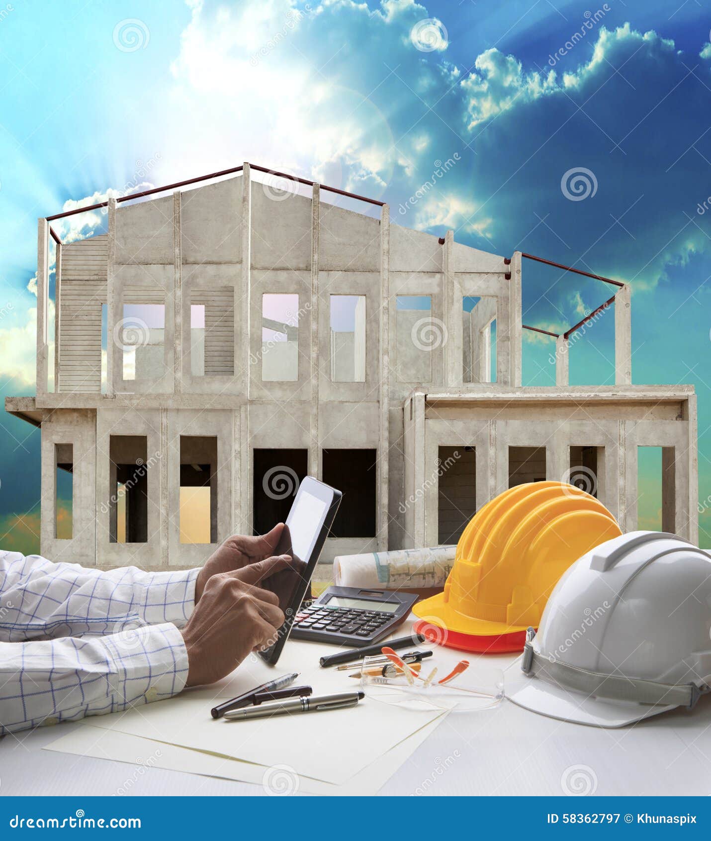 Home Construction and Hand Hold Tablet on Engineer Working Table Stock ...