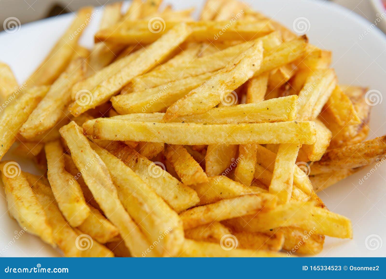 At Home French Fries Close Up Of Finely Chopped Fried Potatoes On White Plate Stock Image