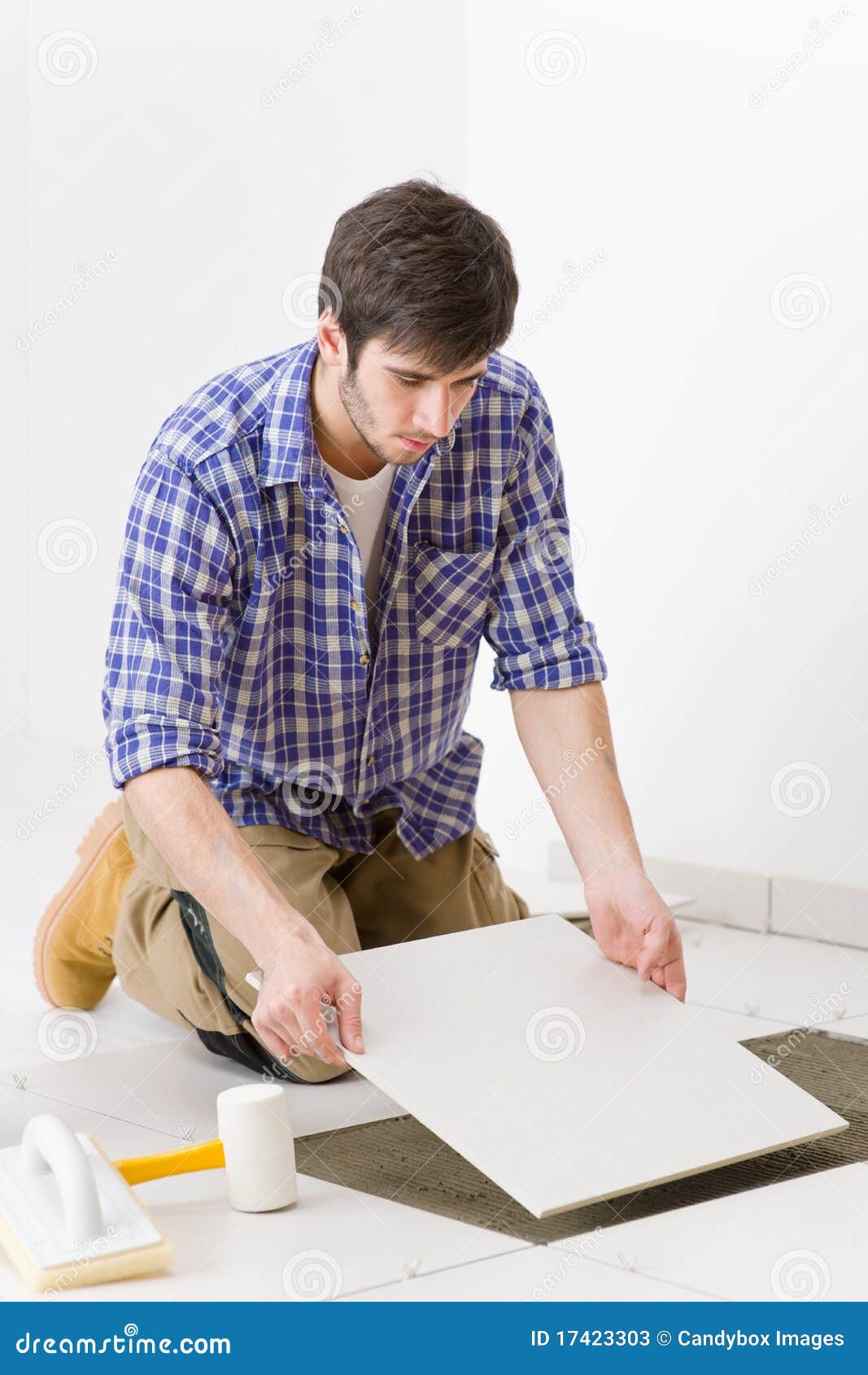 Handyman Laying Ceramic Floor Tiles Stock Photography | CartoonDealer ...