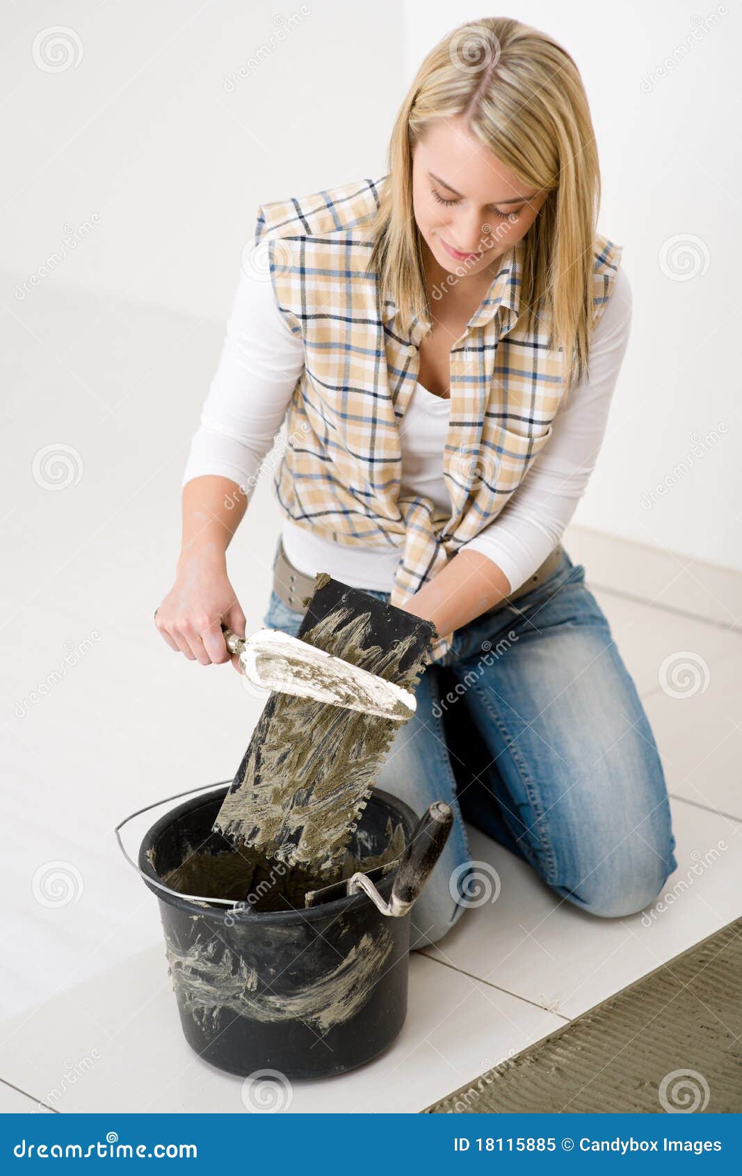 Home Improvement - Handywoman Laying Tile Stock Image - Image of laying ...