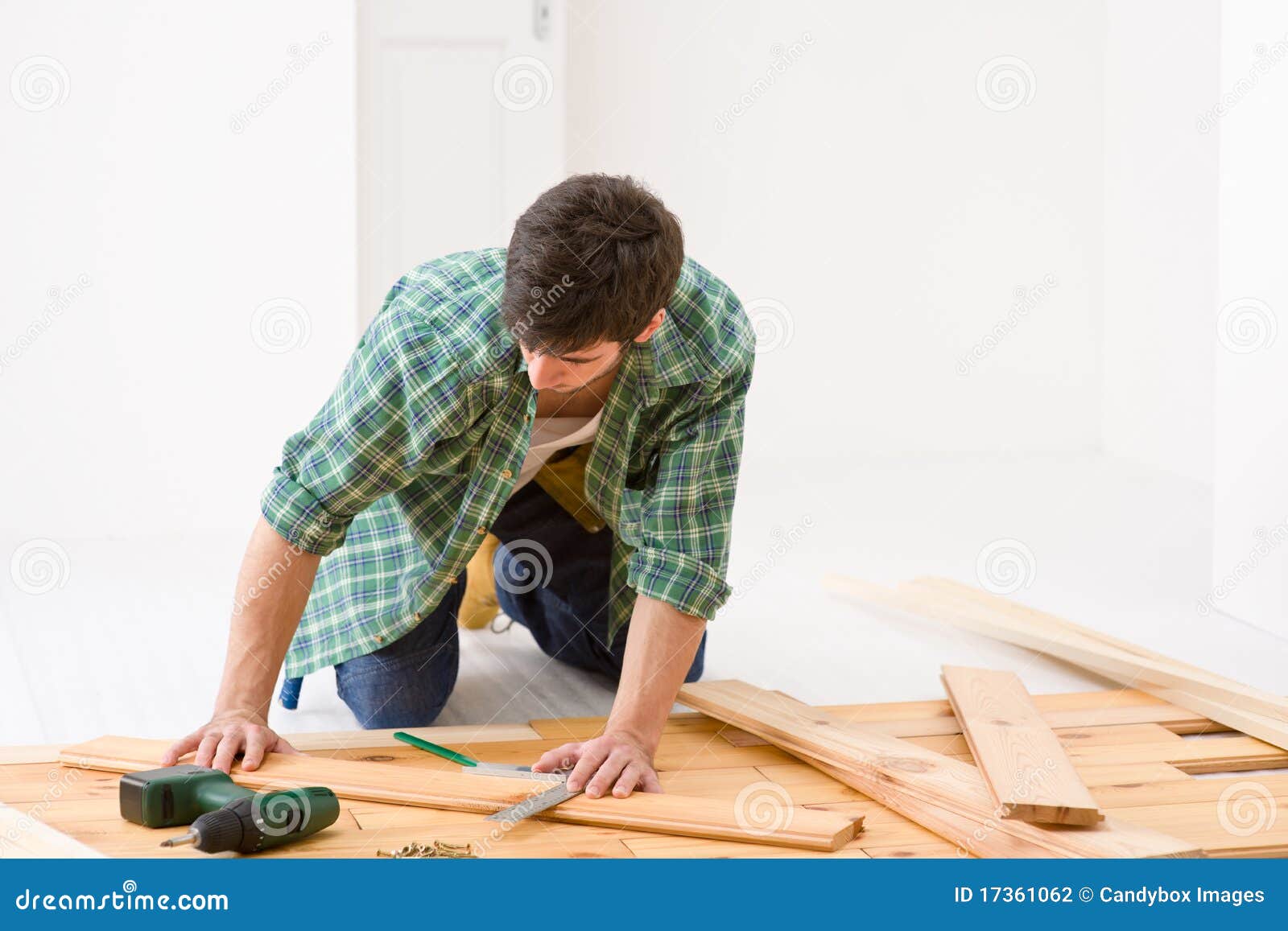 Home Improvement - Man Installing Wooden Floor Stock Photo - Image of ...