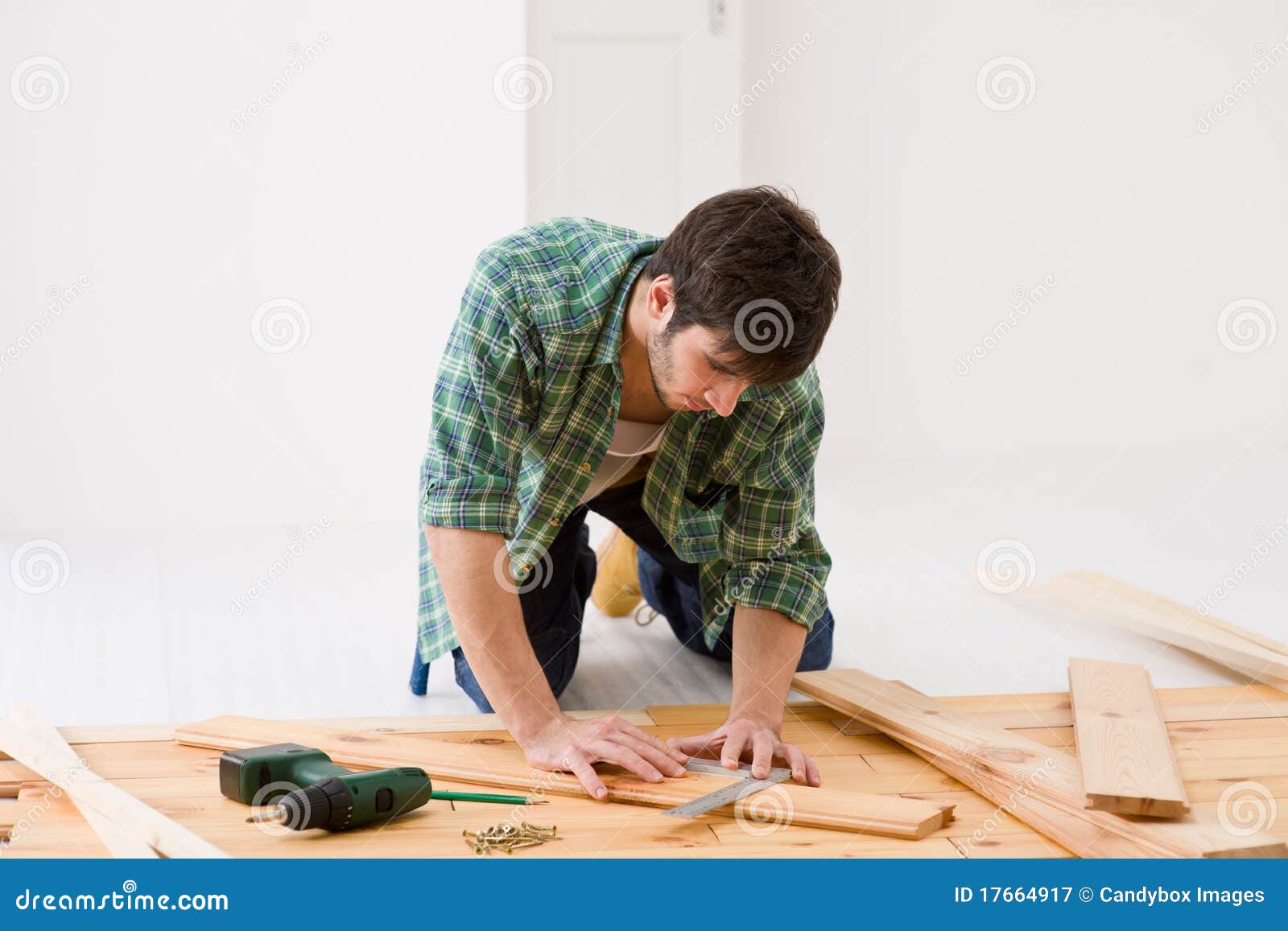 Home Improvement - Man Installing Wooden Floor Stock Image - Image of ...