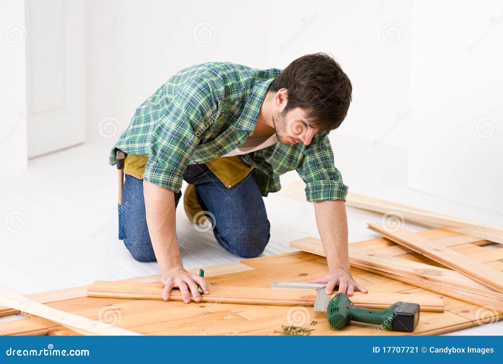 Home Improvement - Man Installing Wooden Floor Stock Image - Image of ...
