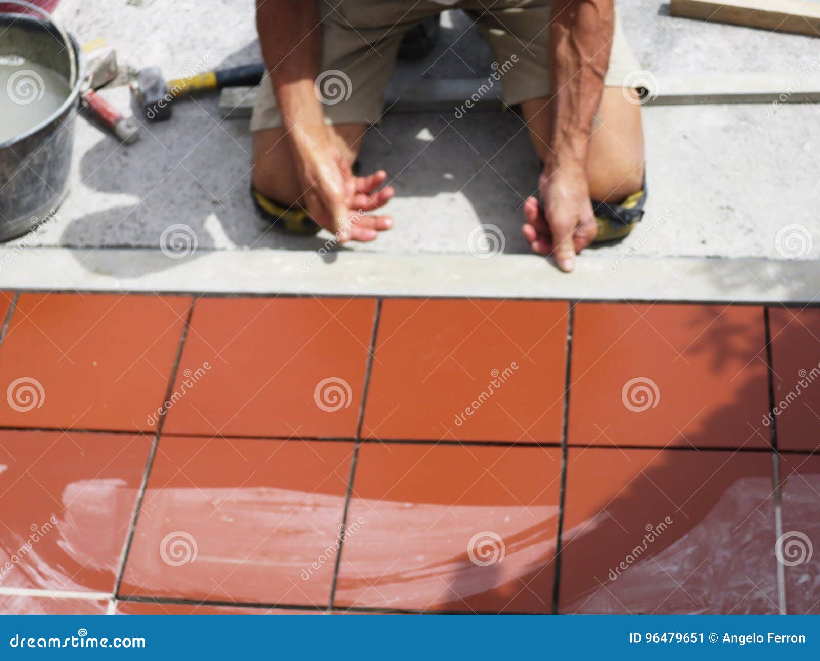 Home Improvement, Renovation - Construction Worker Tiler is Tiling ...