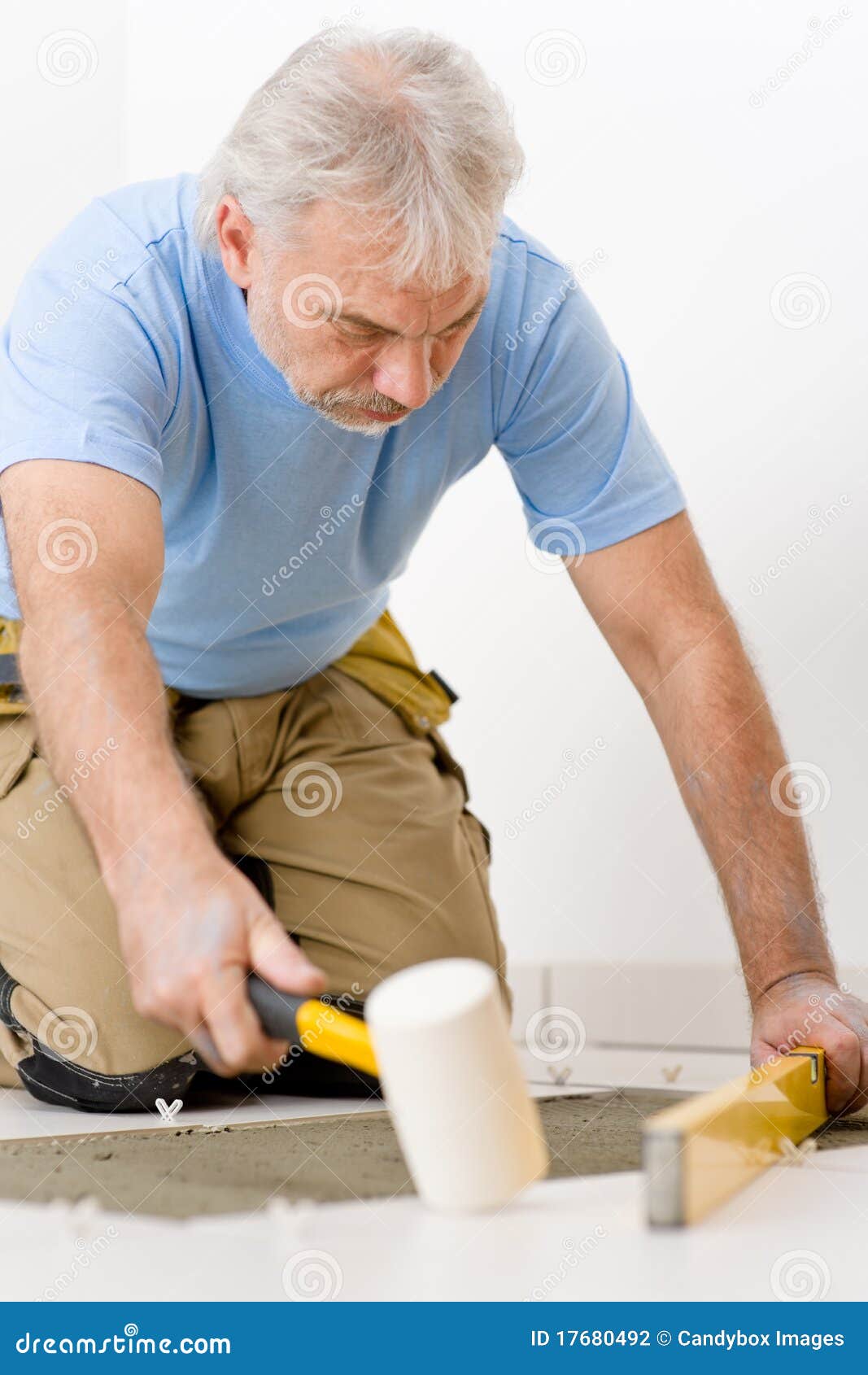 Home Improvement, Renovation - Man Laying Tile Stock Photo - Image of ...