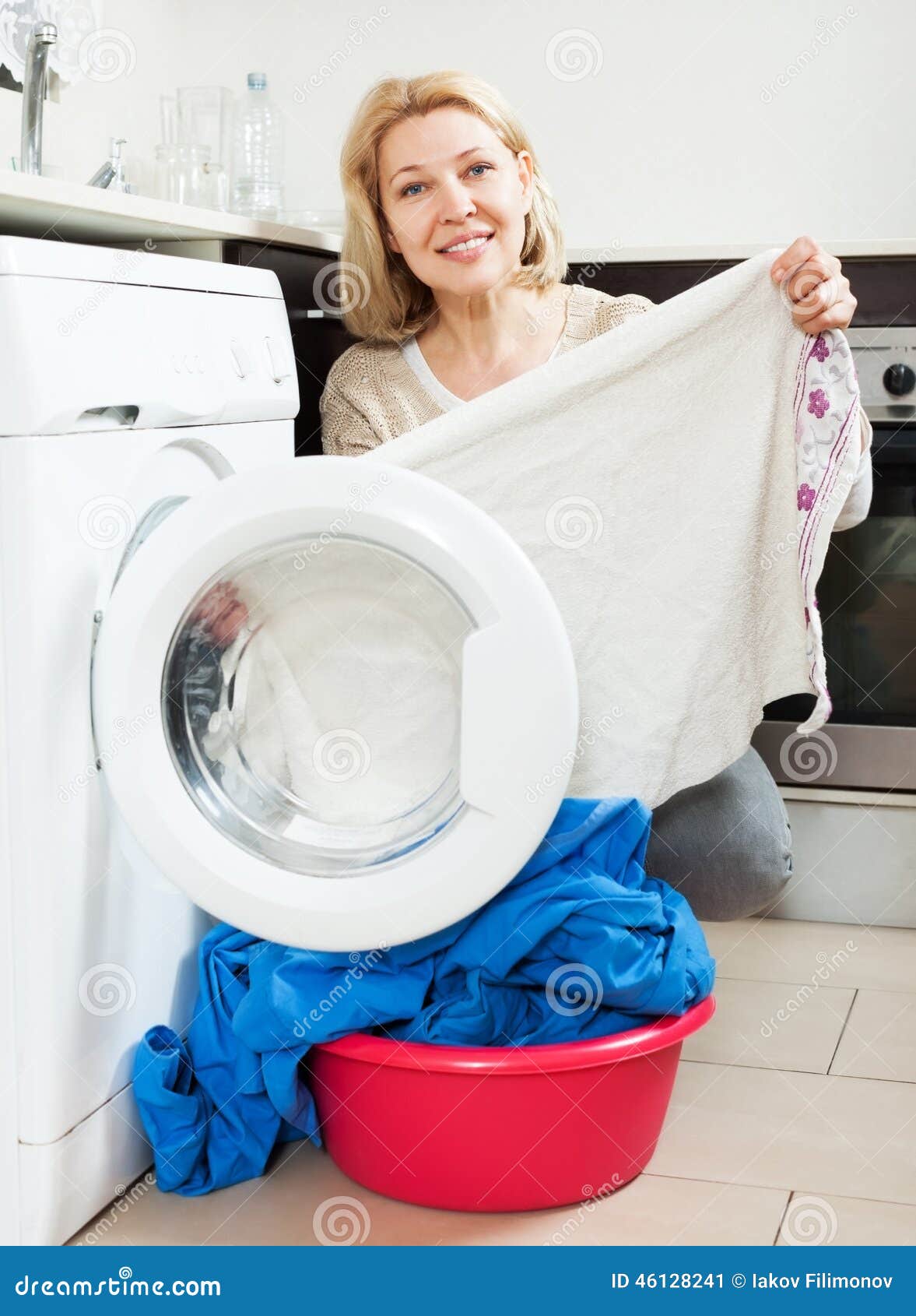 Home Laundry. Woman Using Washing Machine at Home Stock Image - Image ...