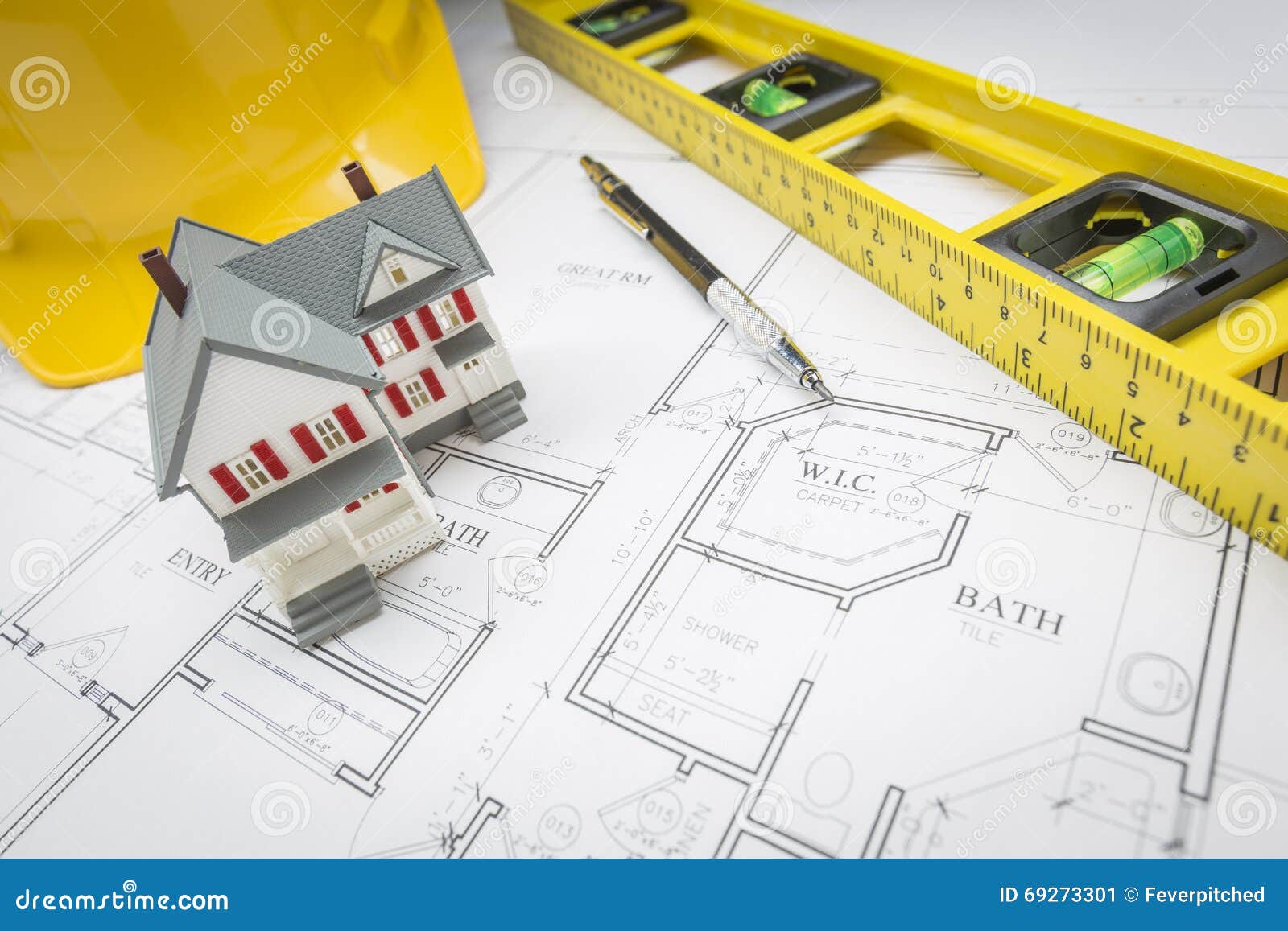 Home, Level, Hard Hat and Pencil Resting on House Plans Stock Image ...