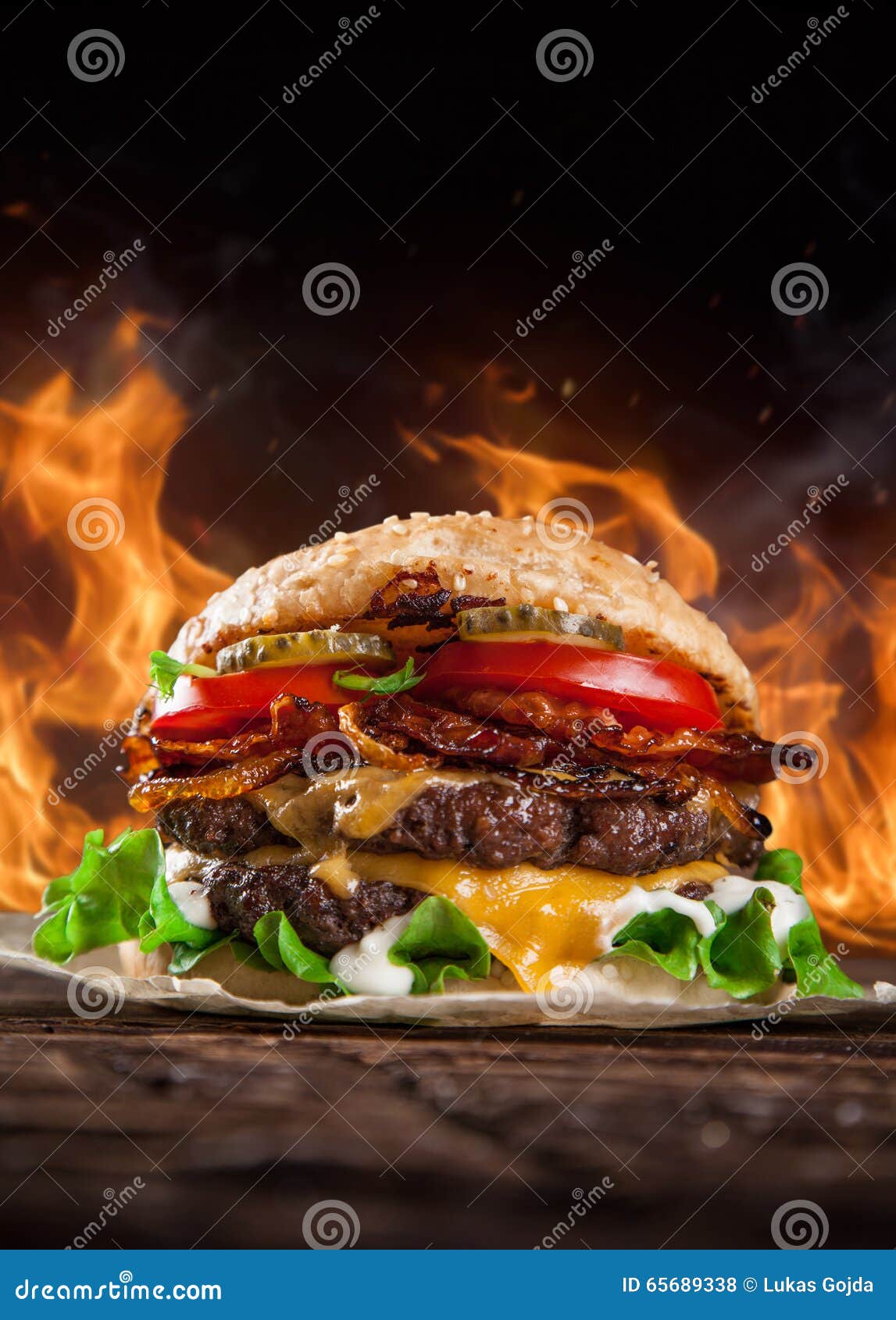 Home Made Burgers with Fire Flames. Stock Photo - Image of dinner ...