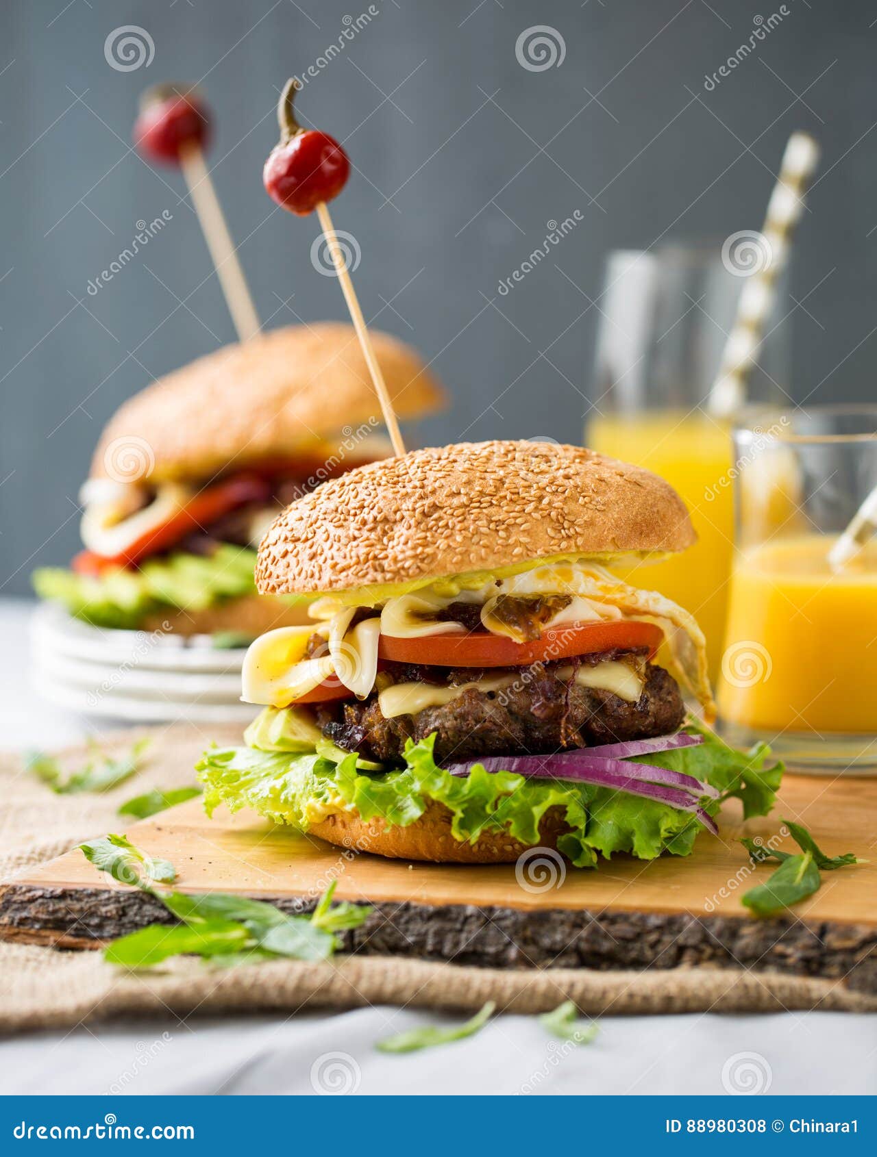 Home Made Burgers with Lettuce, Cheese and Caramelized Onion Stock ...